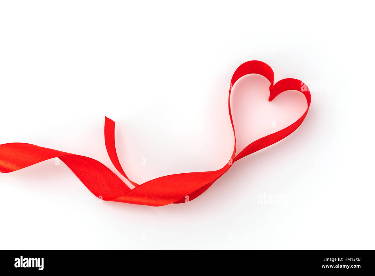 Valentine Heart. Red Silk Ribbon. Love Symbol Stock Photo - Alamy