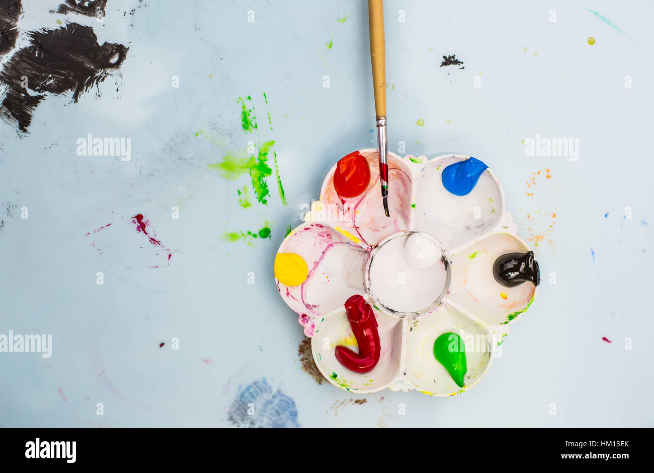 Mixing Water Colors in a painting Class Stock Photo - Alamy