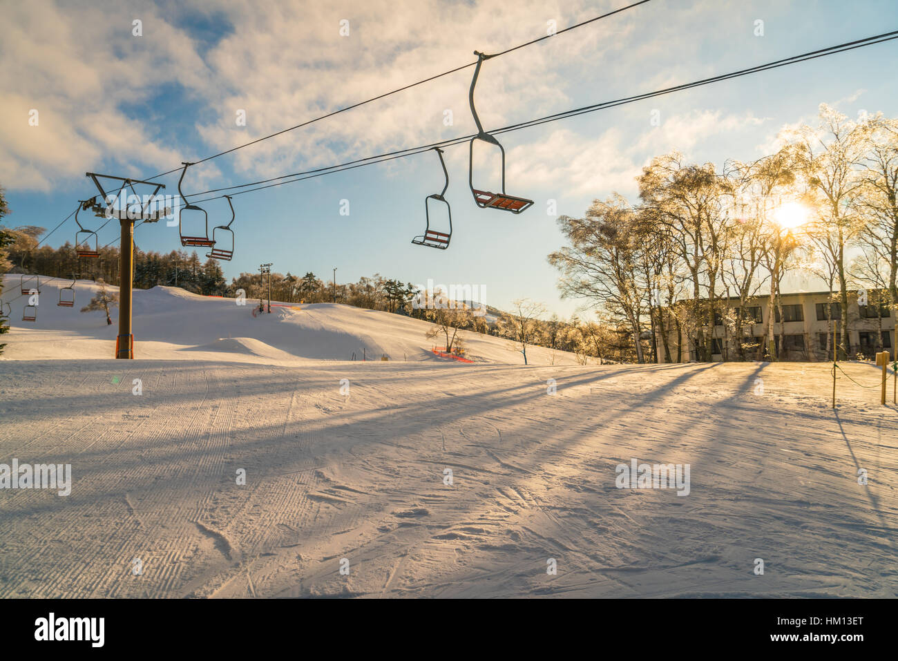 Sunset and Ski lift going over the mountain Stock Photo - Alamy