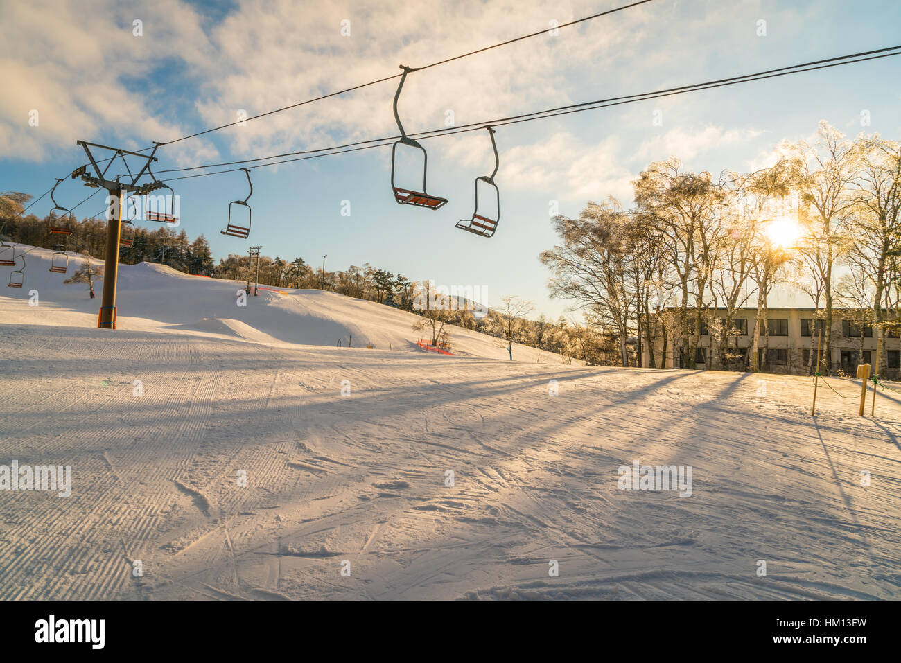 Sunset and Ski lift going over the mountain Stock Photo - Alamy