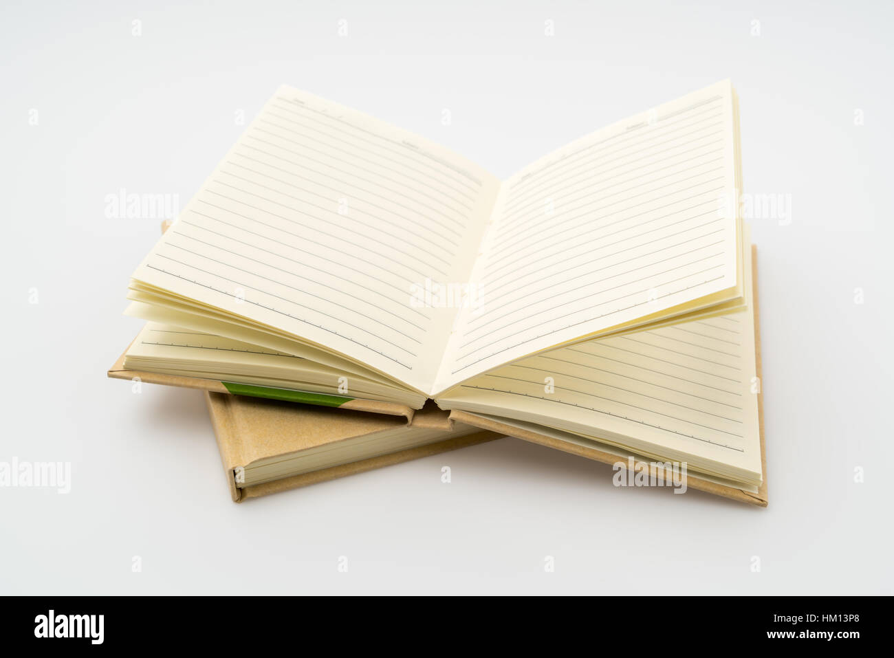 Recycled paper book on white background Stock Photo - Alamy