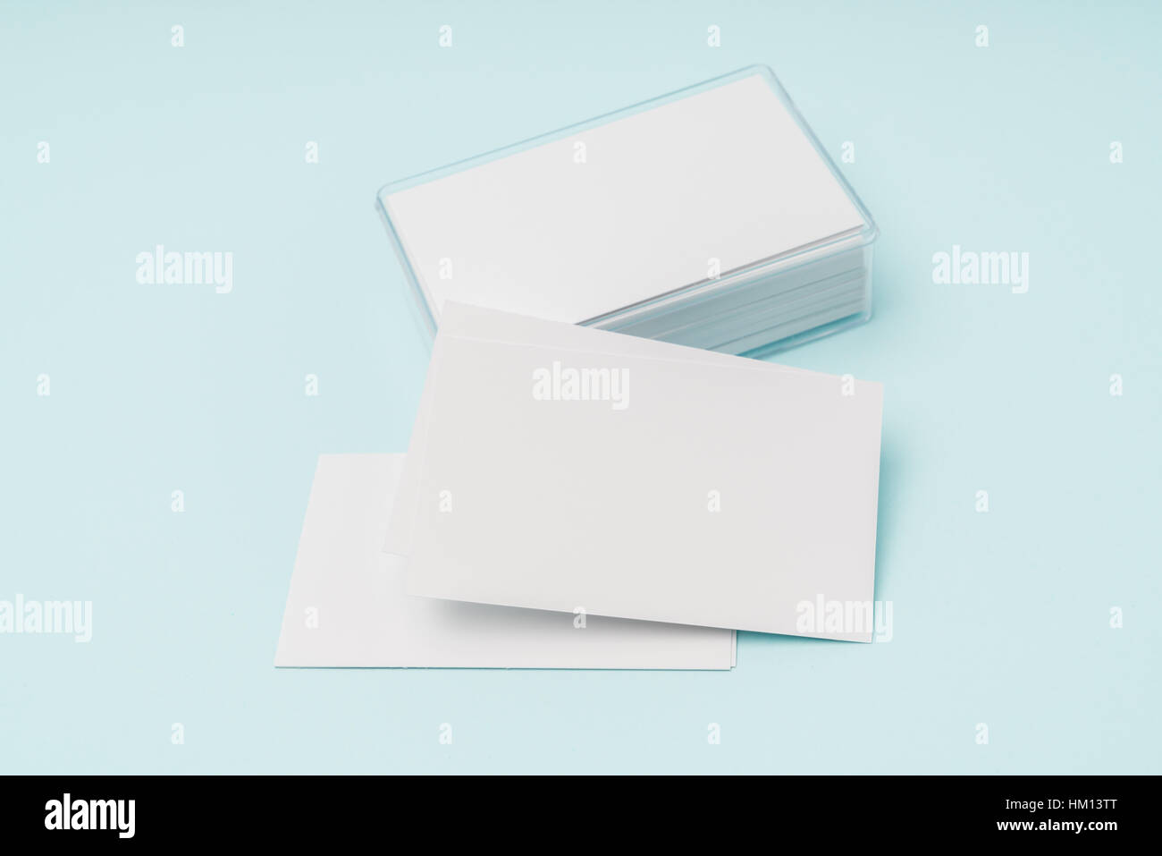 Blank business card on blue background Stock Photo - Alamy