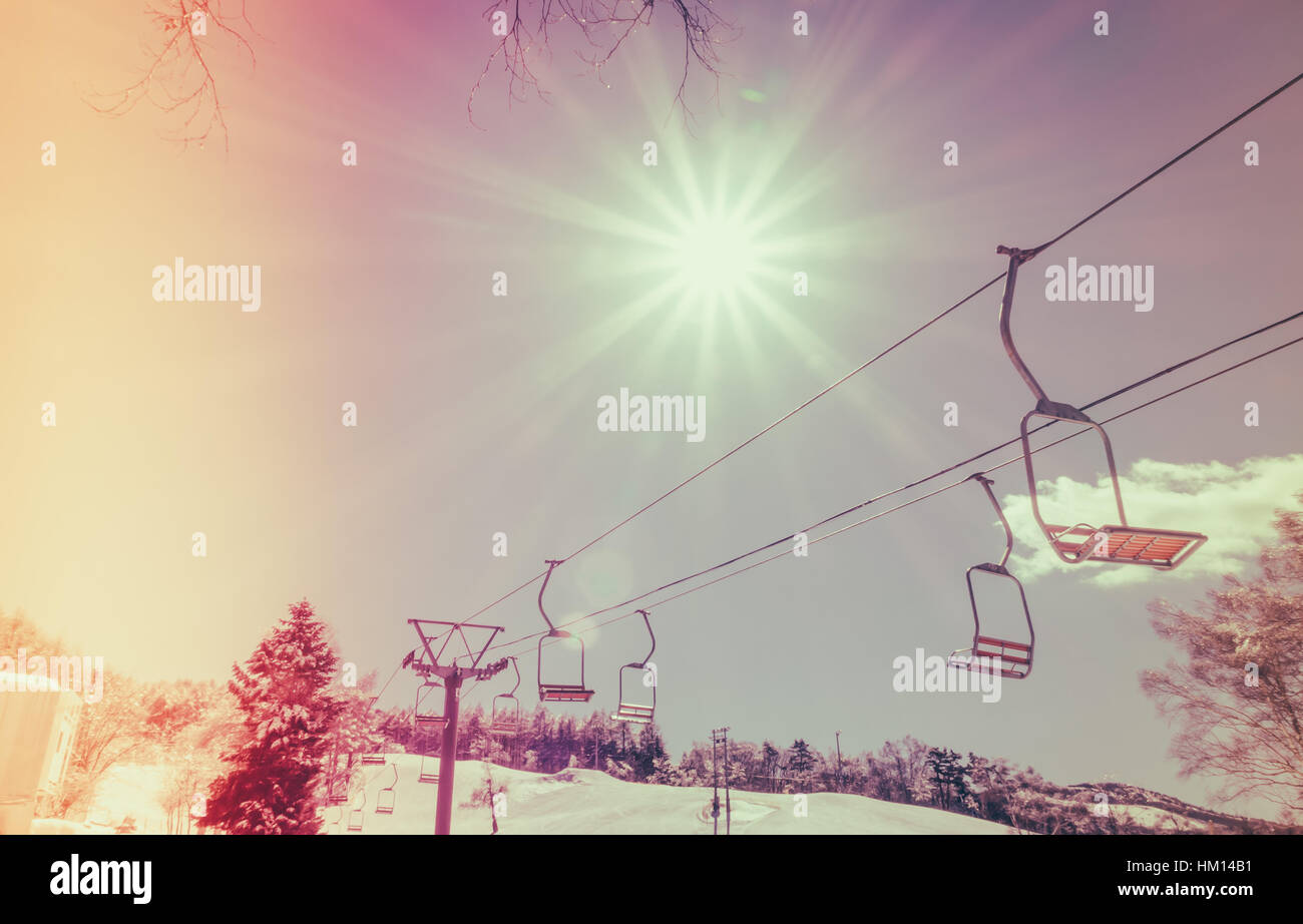 Sunset and Ski lift going over the mountain ( Filtered image processed ...