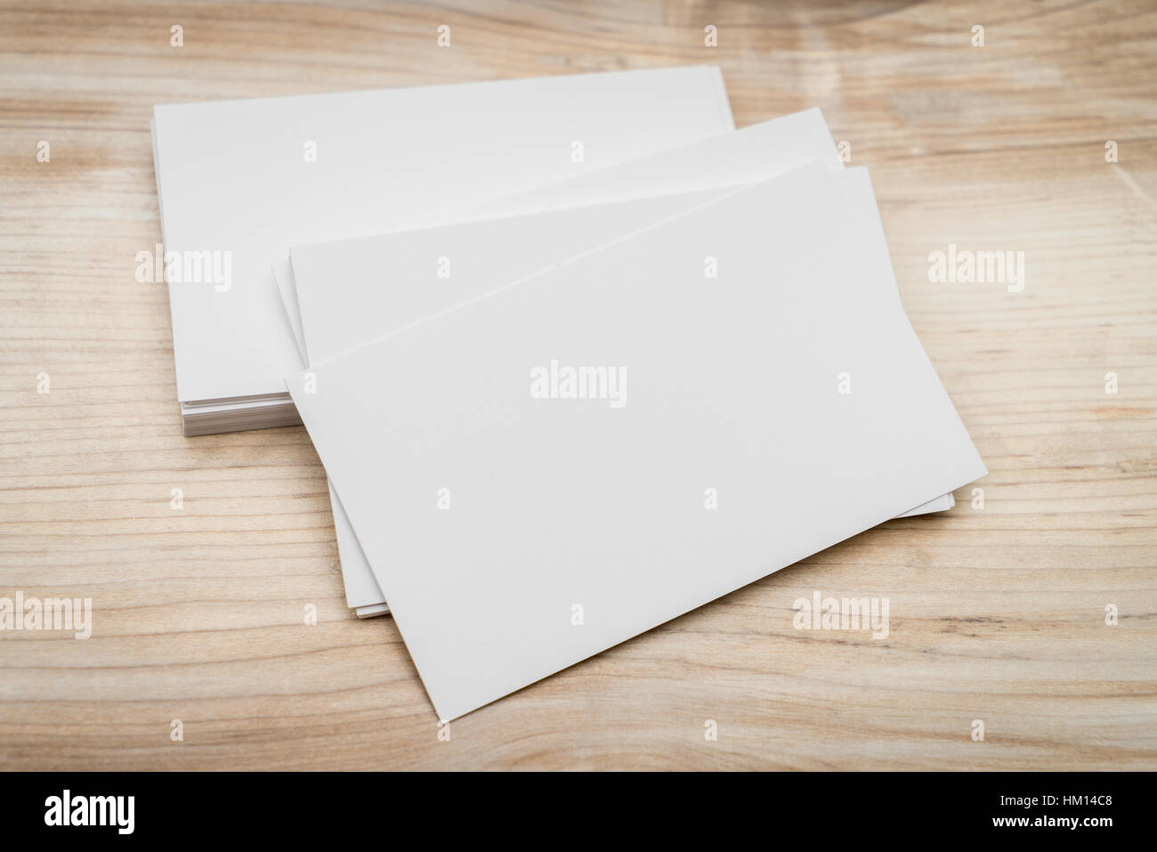 Business cards on wood table Stock Photo - Alamy