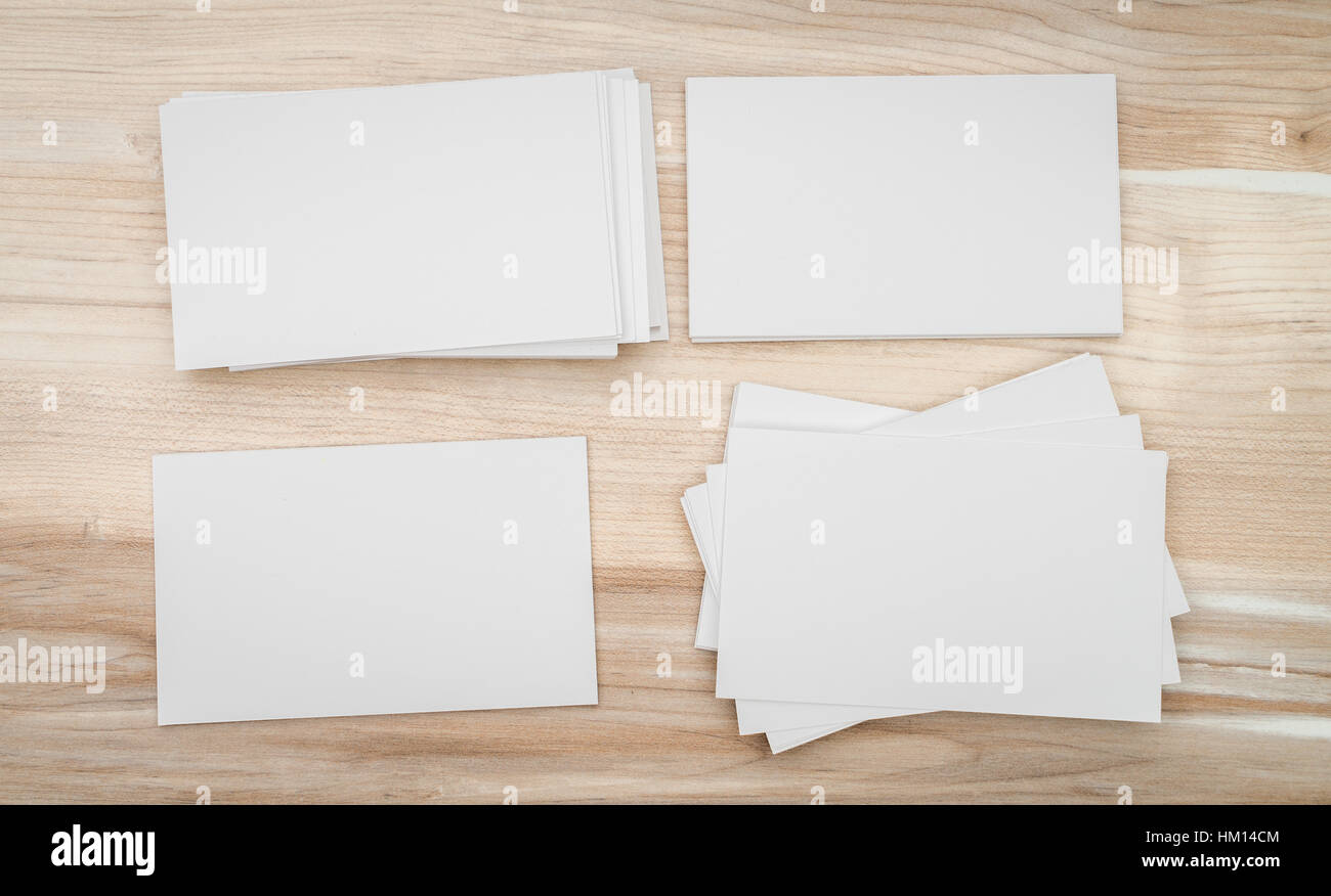 Business cards on wood table Stock Photo - Alamy