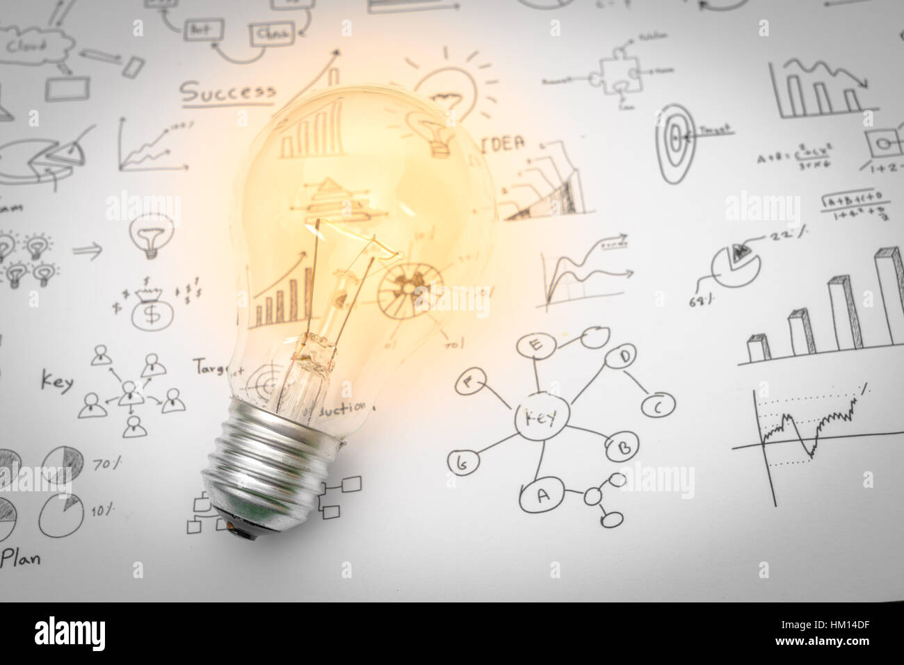Light bulb with drawing graph Stock Photo - Alamy