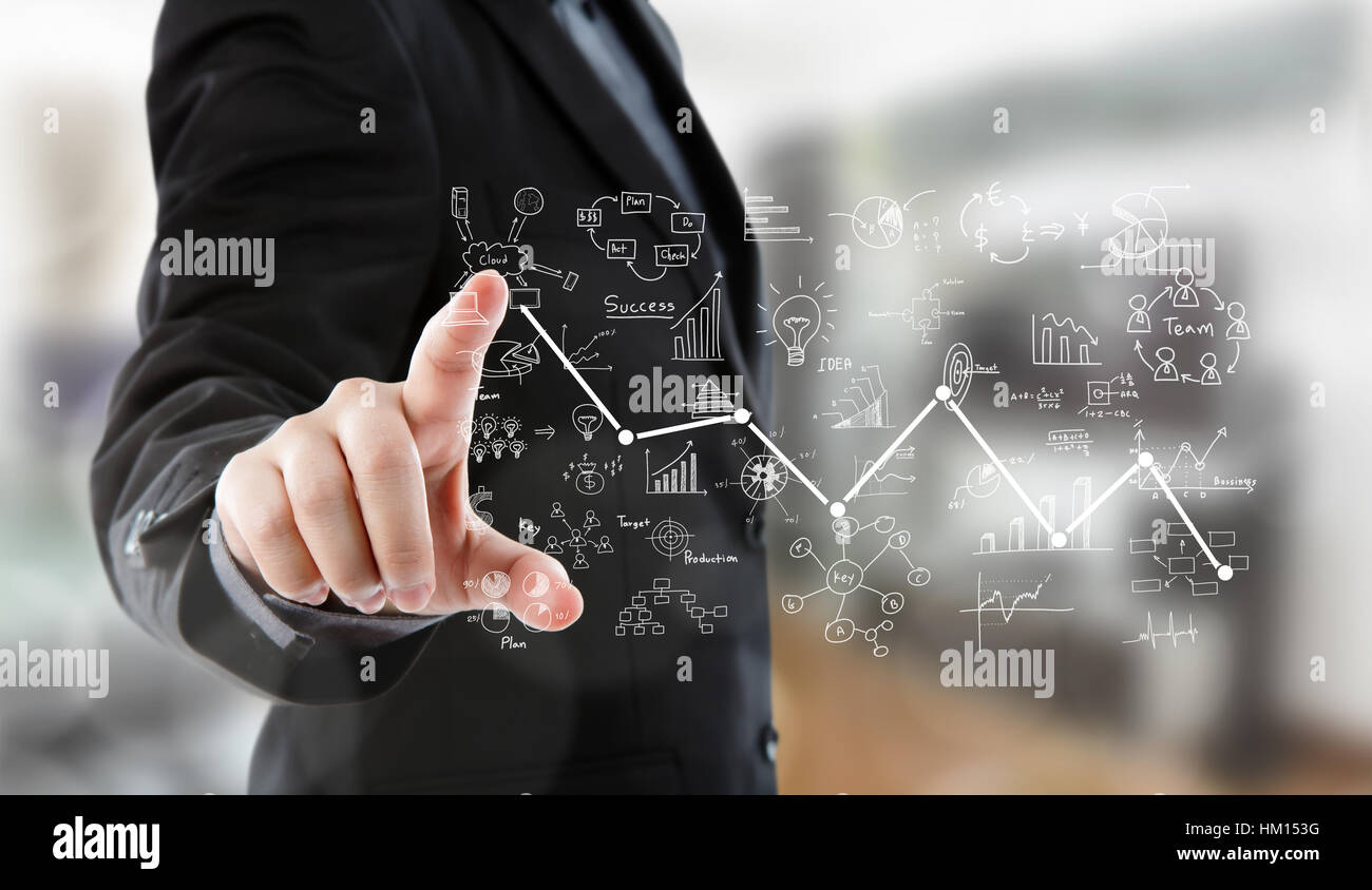 Business man pressing high tech type of modern graph Stock Photo - Alamy
