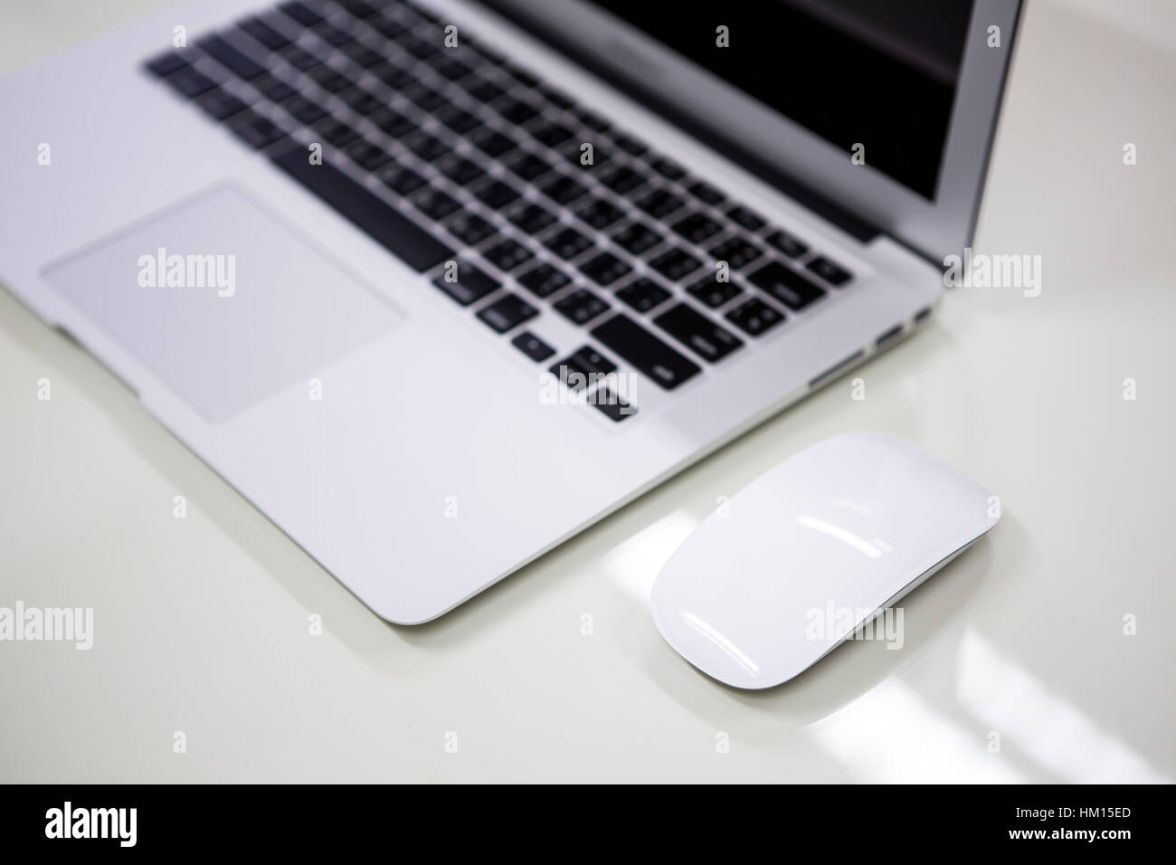 laptop and mouse Stock Photo - Alamy