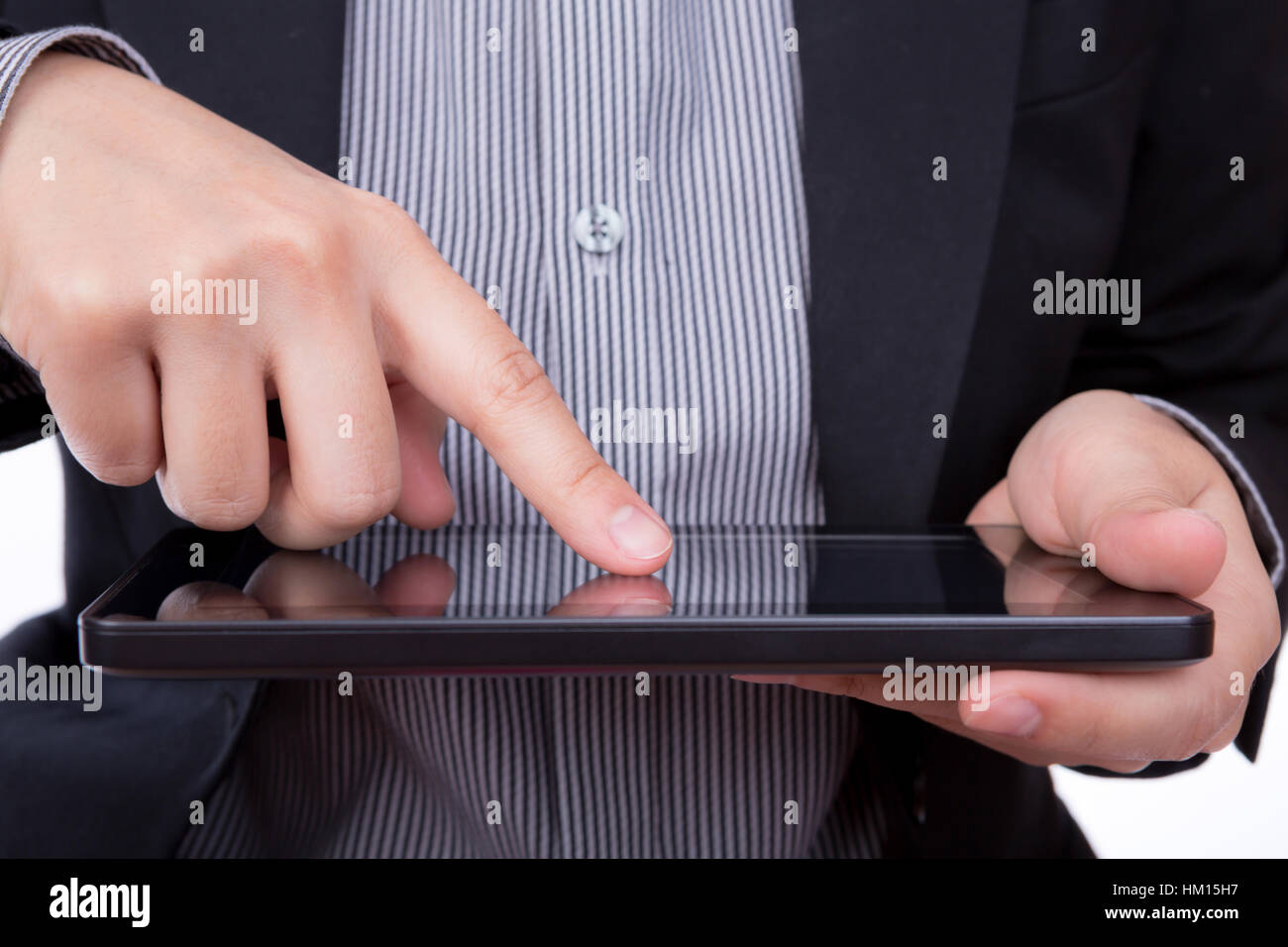 Business man using a touch screen device Stock Photo - Alamy