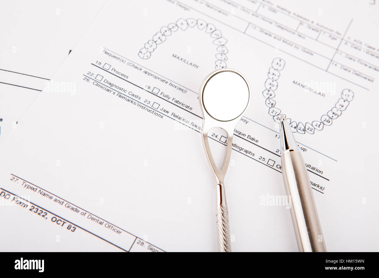 Dental tools and equipment on dental chart Stock Photo - Alamy