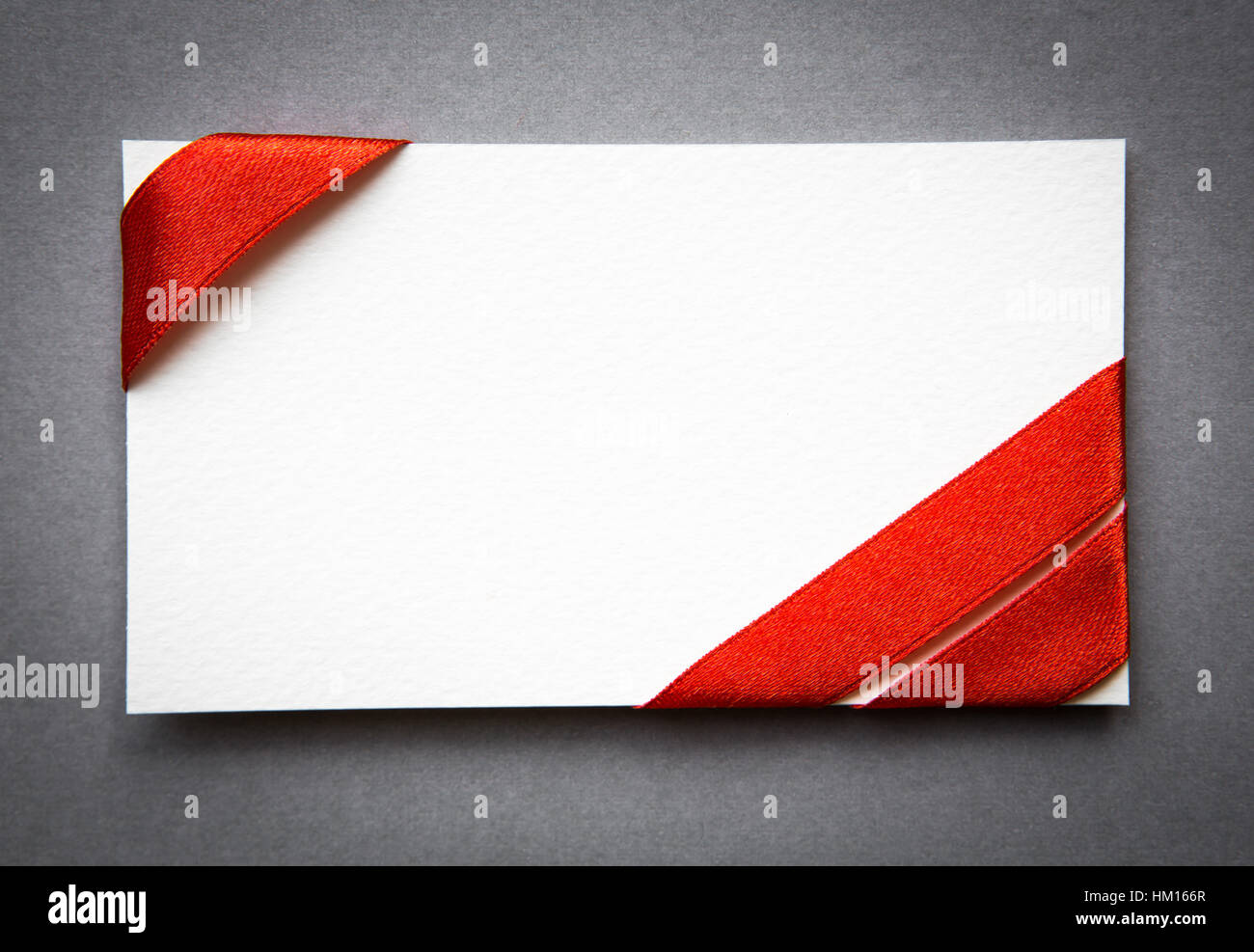 Card with red ribbons bows Stock Photo - Alamy