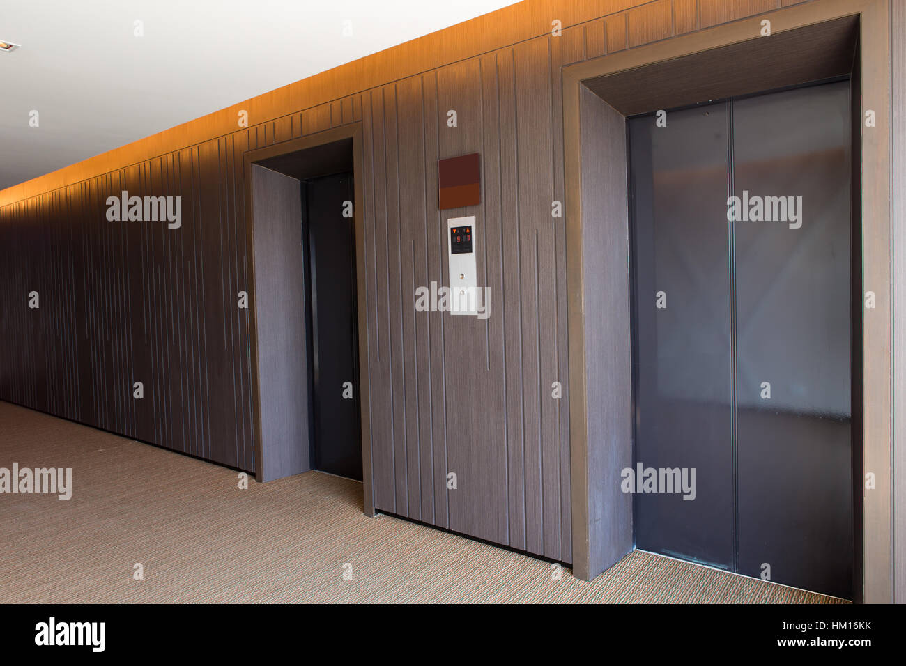 Modern elevator with closed doors Stock Photo - Alamy