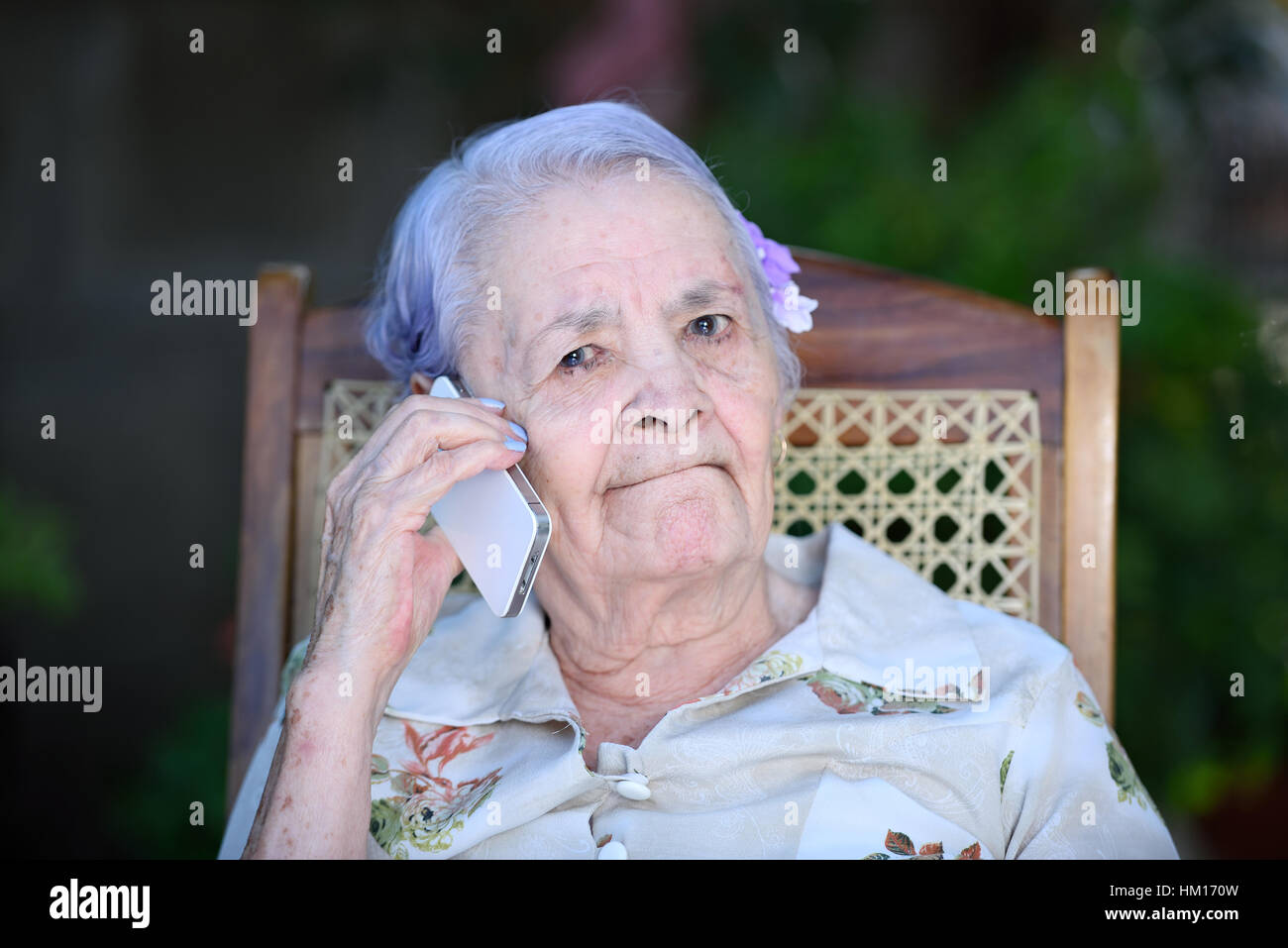 grandma making phone call with white smartphone Stock Photo - Alamy