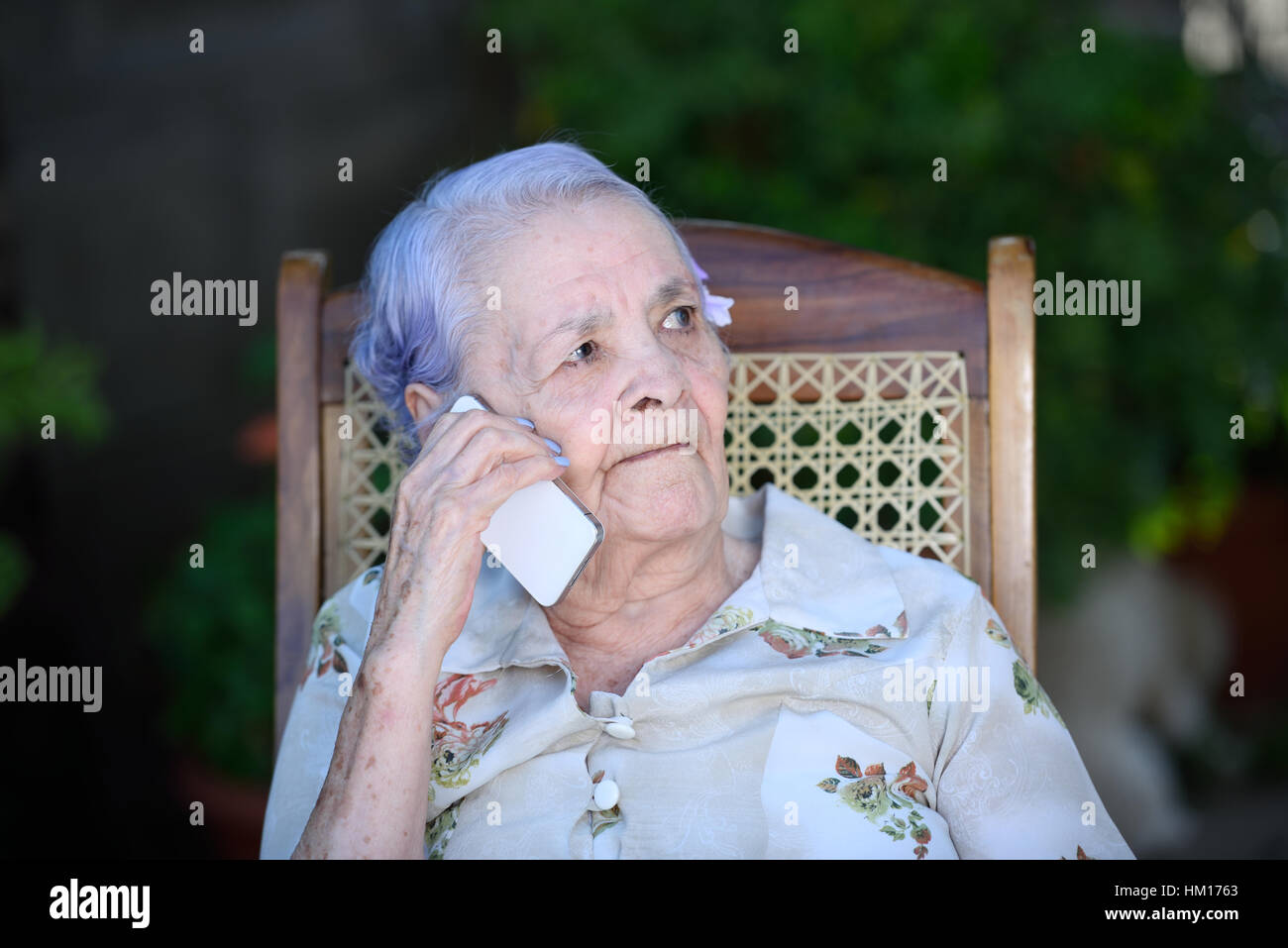 old grandma talking on modern white smartphone Stock Photo - Alamy