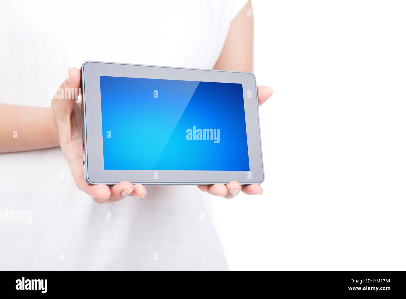 Woman hand using a touch screen device against white background Stock ...