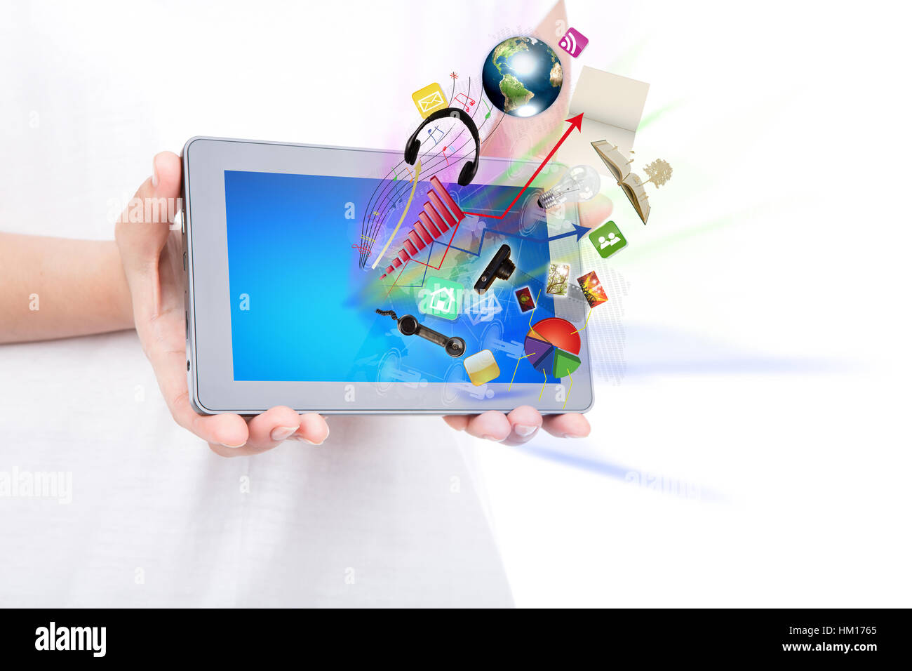 Woman hand using a touch screen device against white background ...