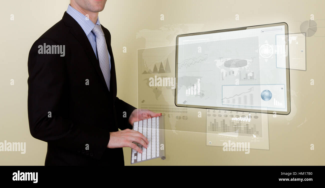 Businessman using touch screen device Stock Photo - Alamy