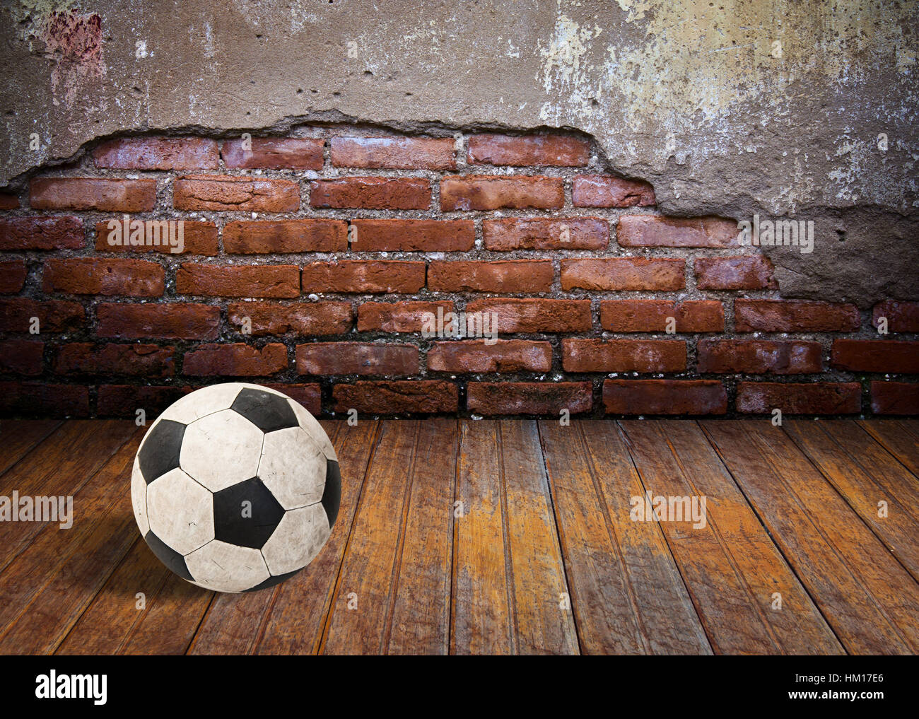 soccer ball in the old brick room Stock Photo - Alamy