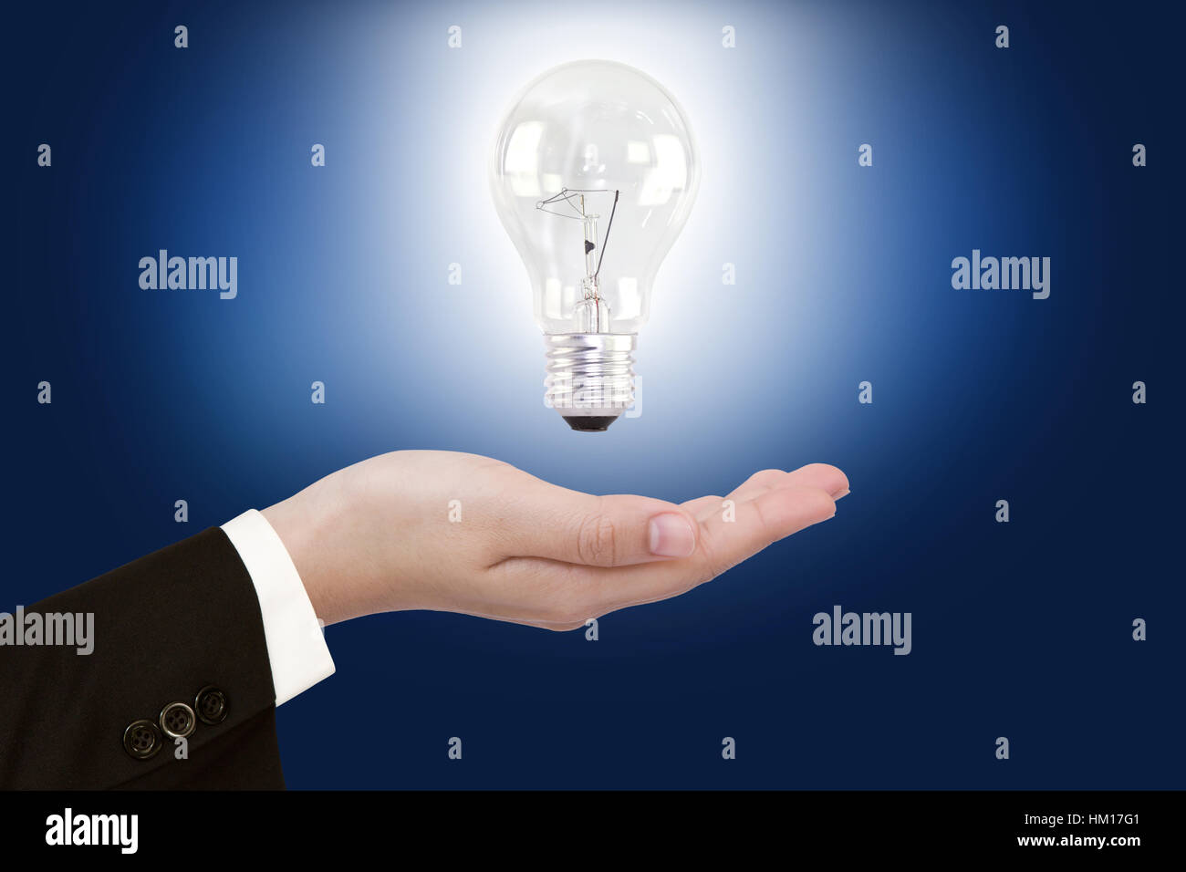women hand with Light bulb Stock Photo - Alamy