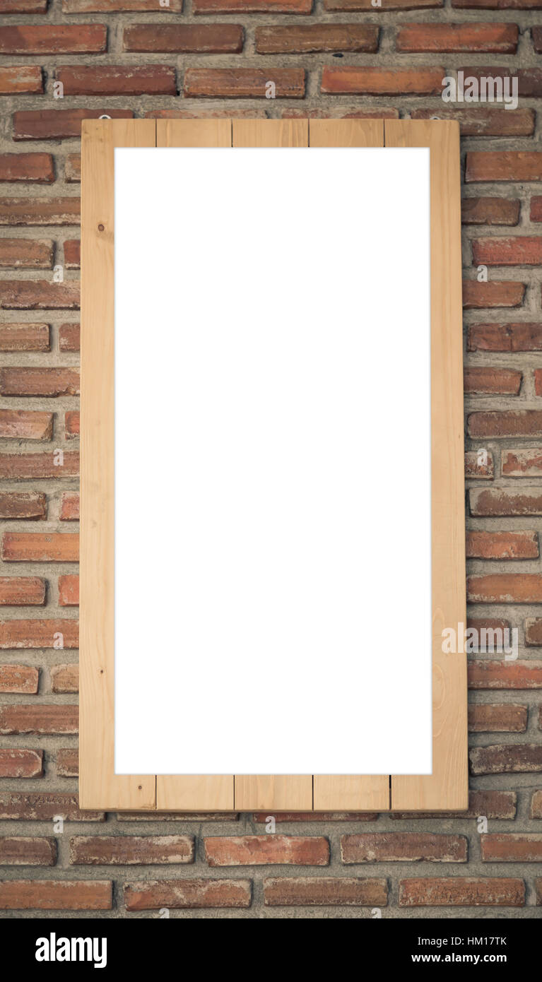 Wood frame on a brick wall Stock Photo - Alamy
