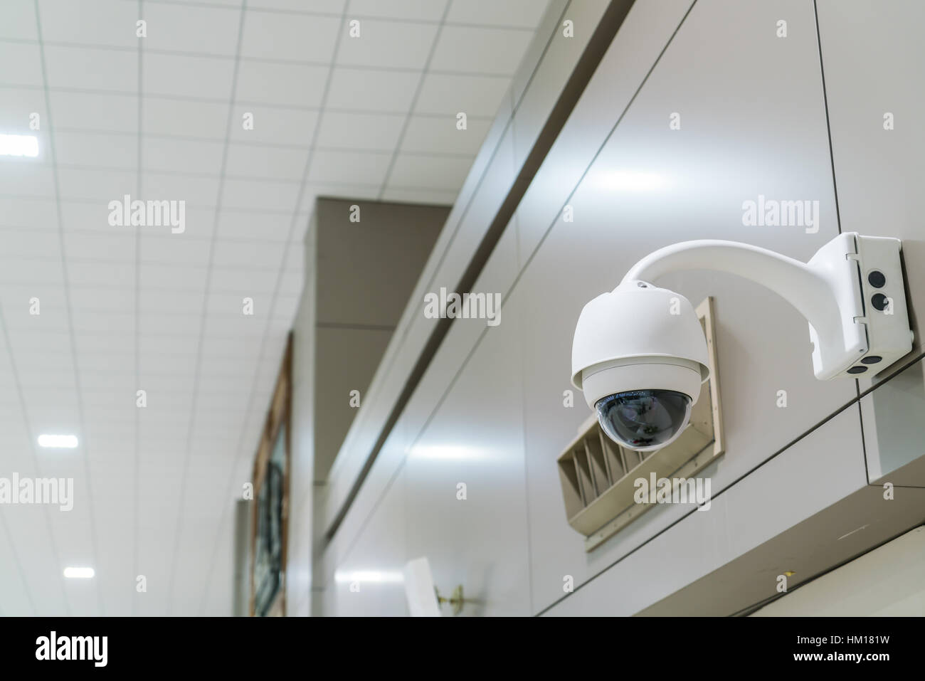 CCTV Camera Operating inside at airport terminal Stock Photo - Alamy