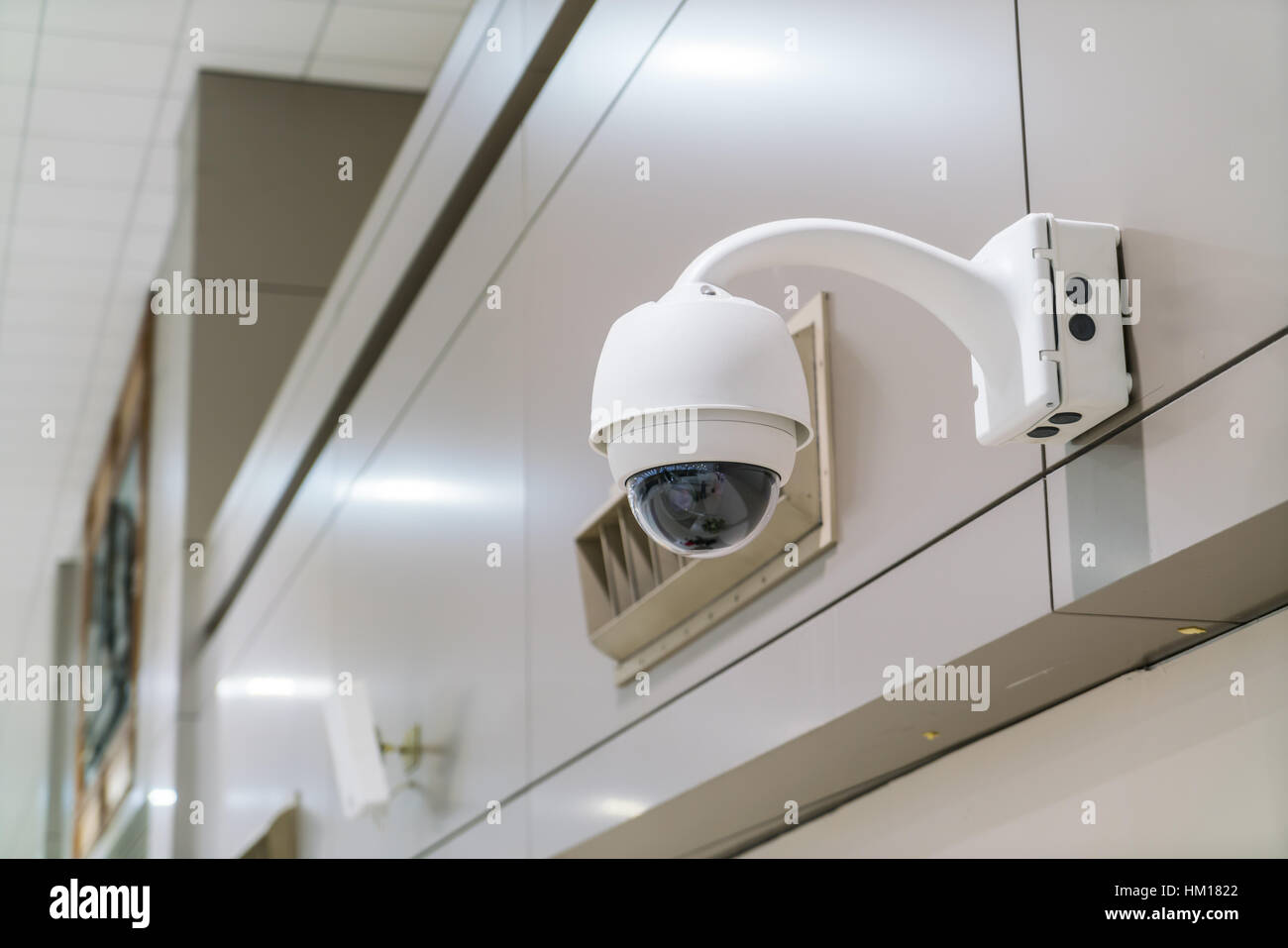 CCTV Camera Operating inside at airport terminal Stock Photo - Alamy