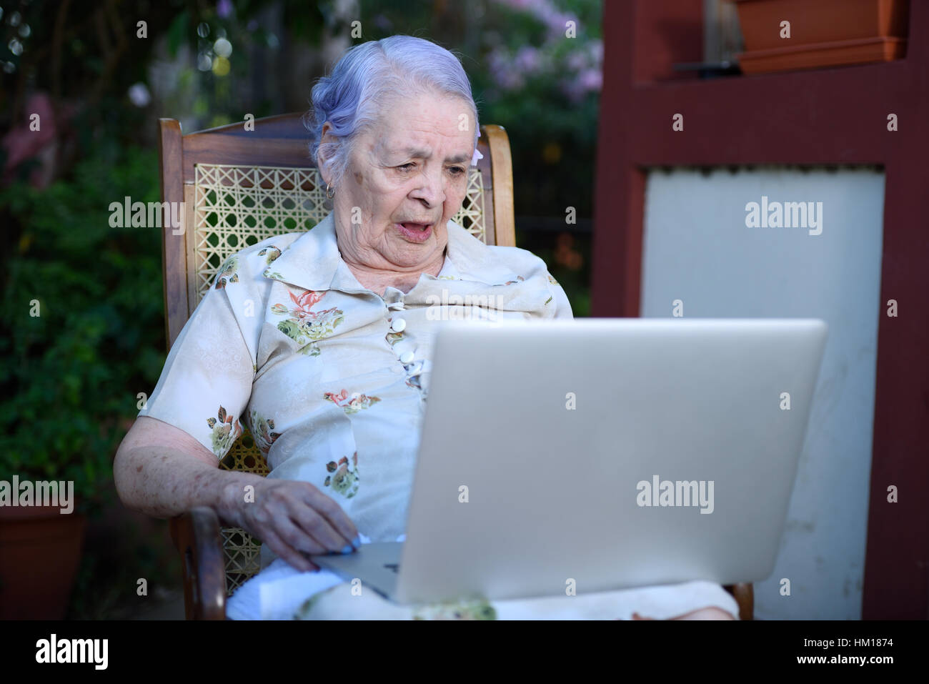 grandma on a videocall using a laptop Stock Photo - Alamy