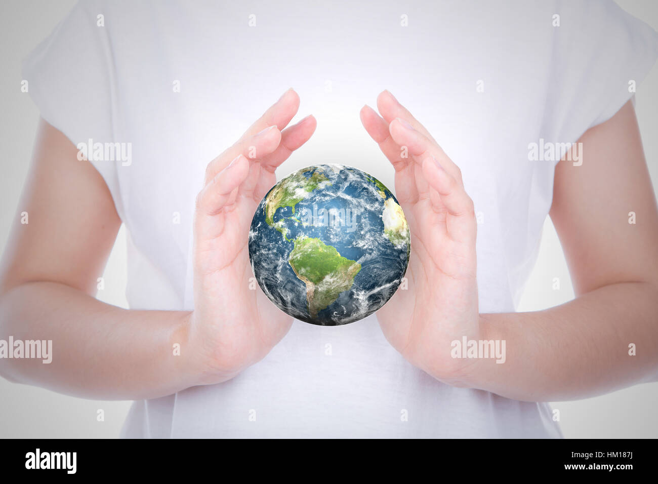 Hands with earth (Elements of this image furnished by NASA Stock Photo ...