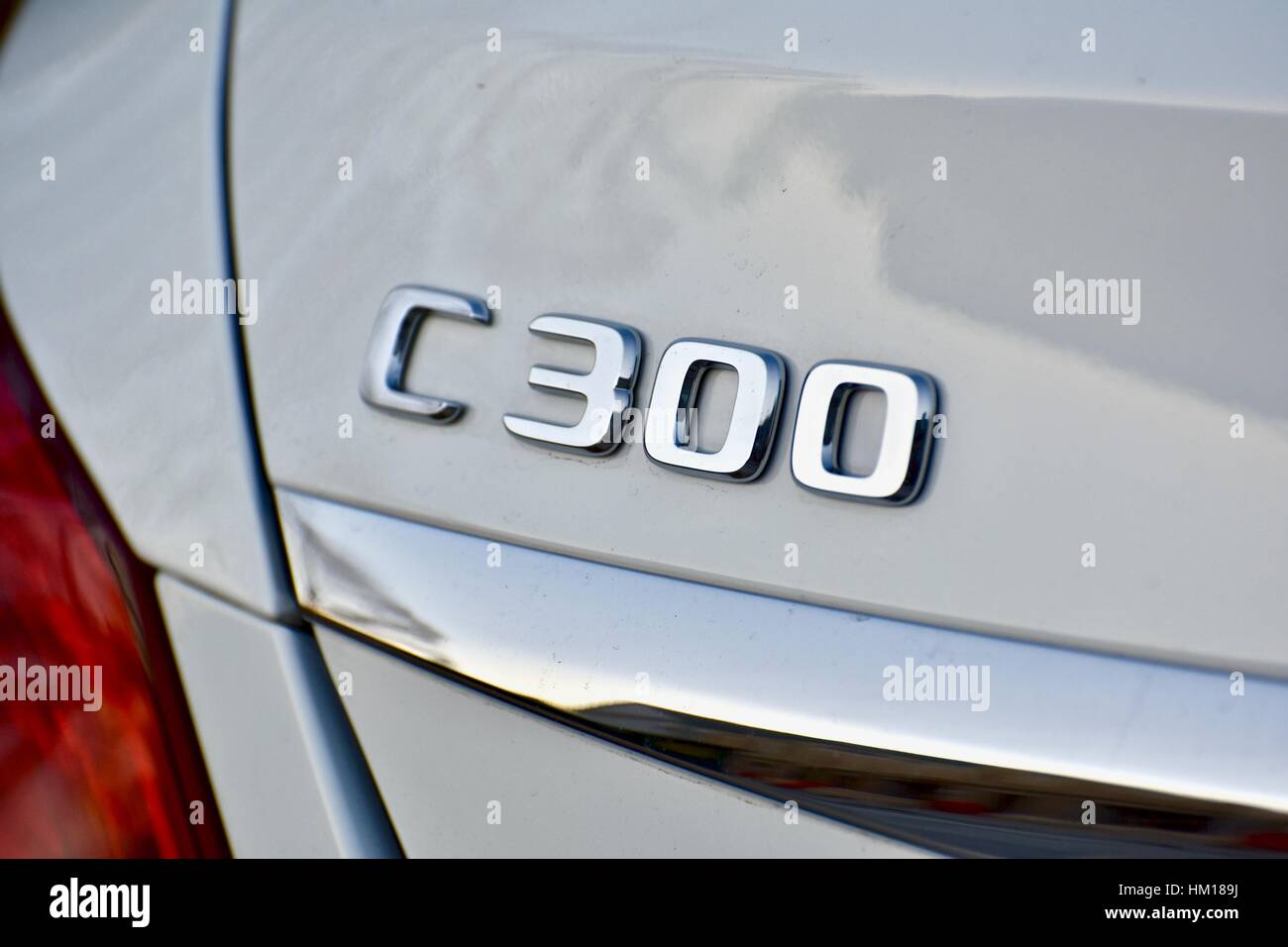 The rear end of a white Mercedes Benz C-300 luxury sedan Stock Photo ...