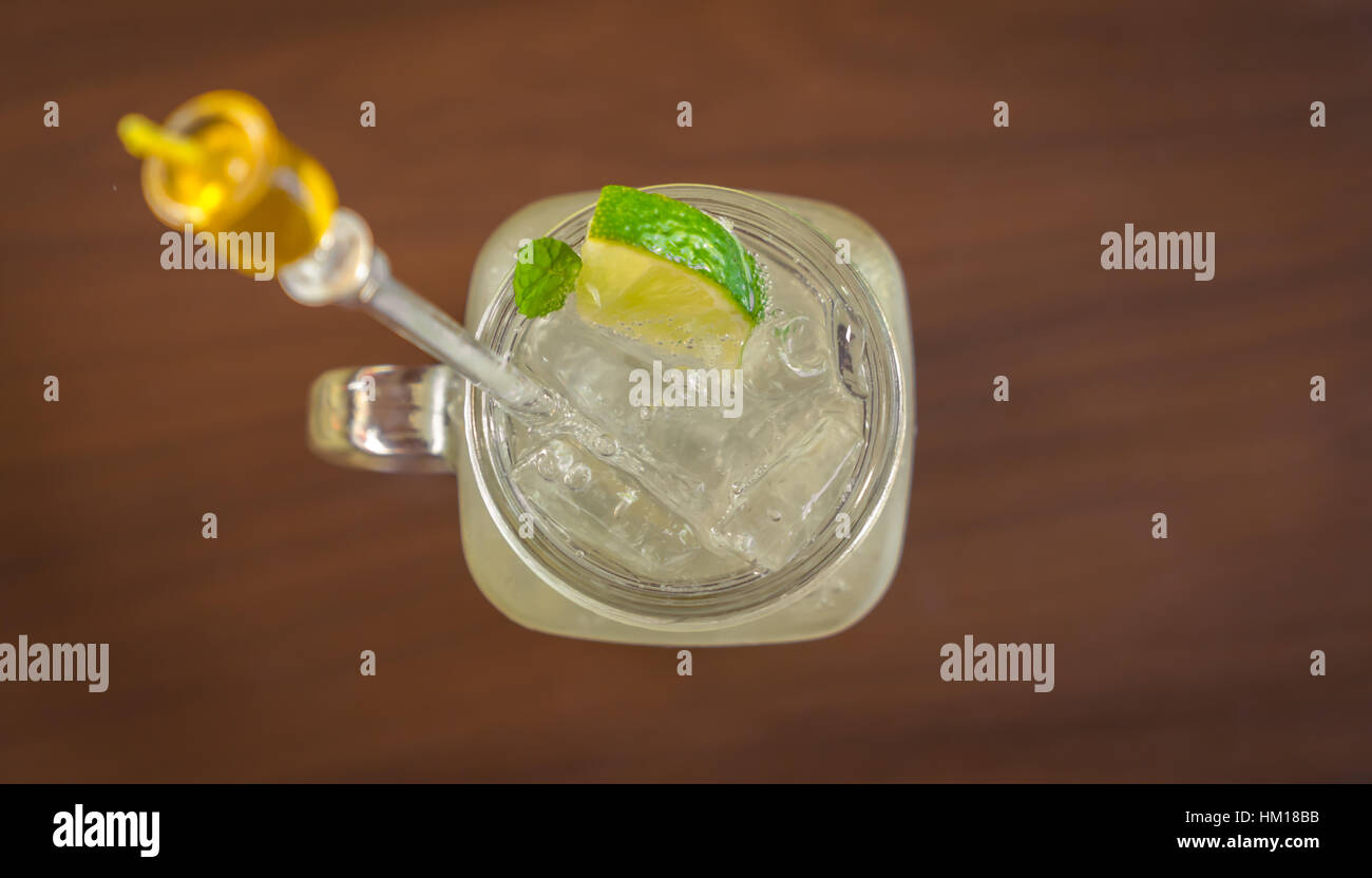 Fresh lemonade on wood table Stock Photo - Alamy