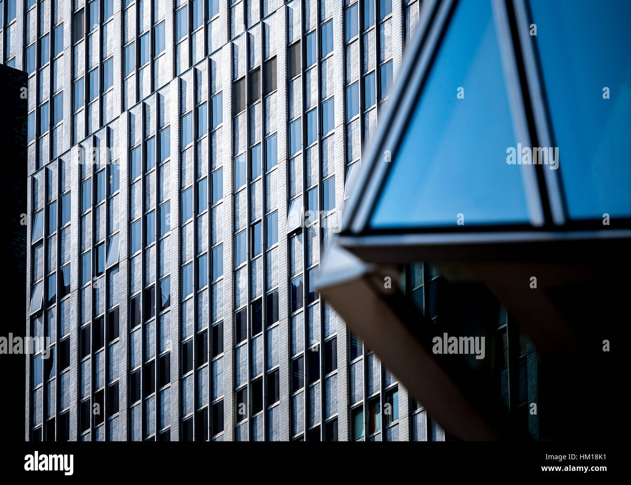 Windows of commercial building in Hong Kong Stock Photo - Alamy