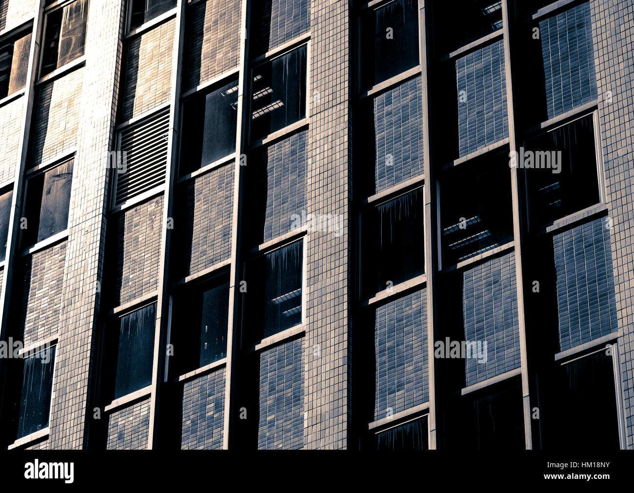 Windows of commercial building in Hong Kong Stock Photo - Alamy