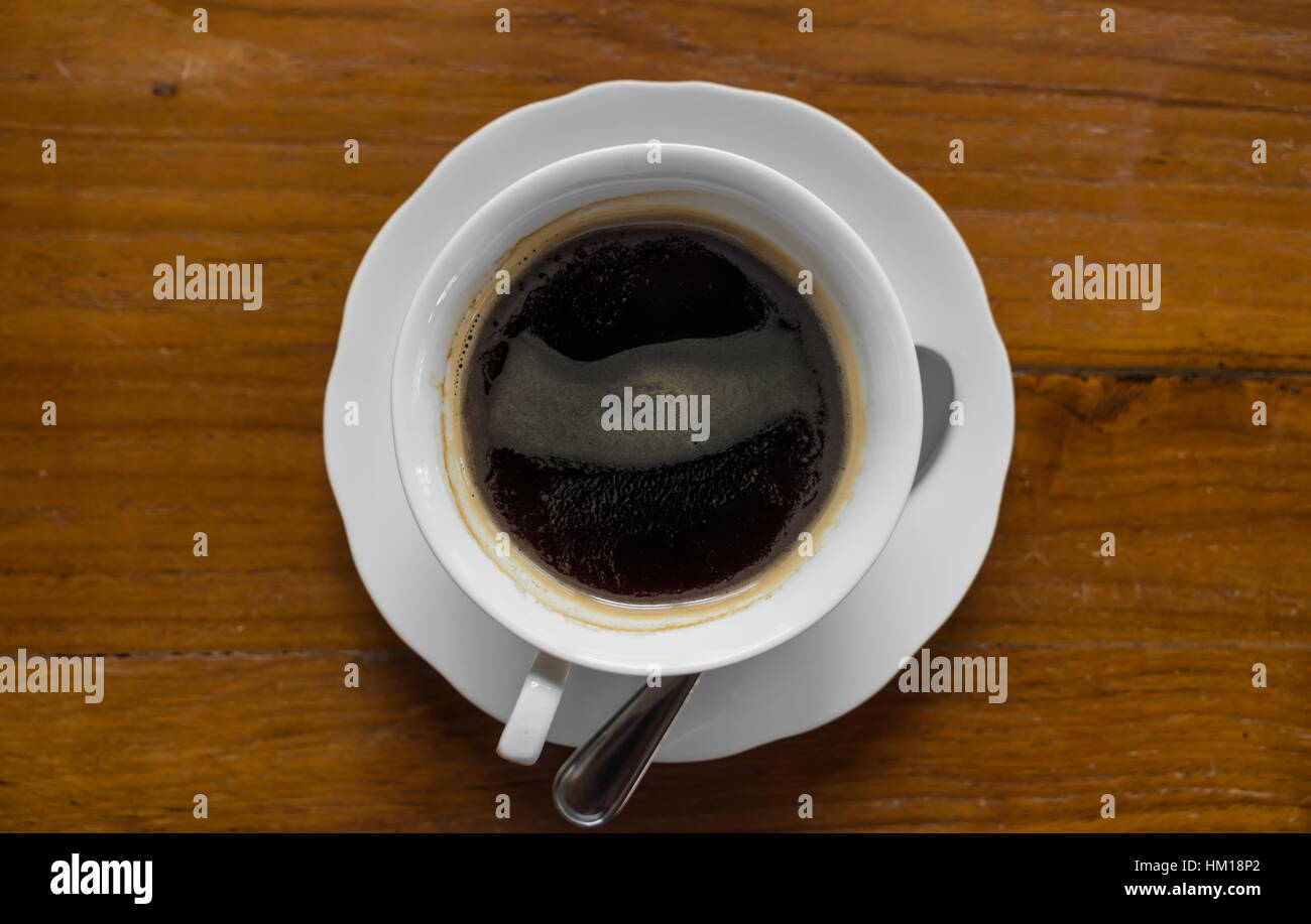 Espresso Coffee cup on wood table Stock Photo - Alamy