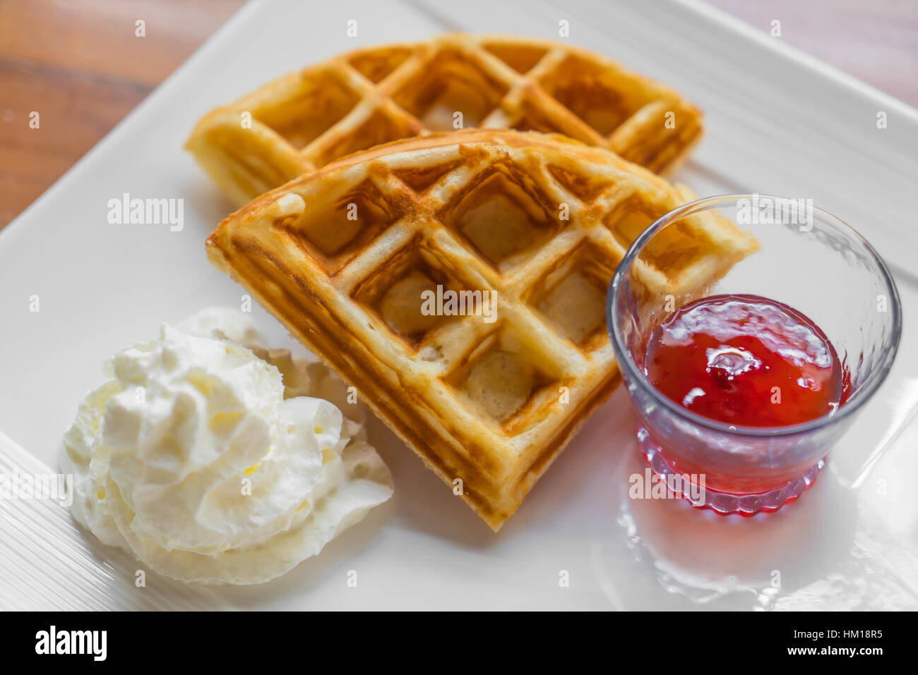 Waffles on table Stock Photo - Alamy