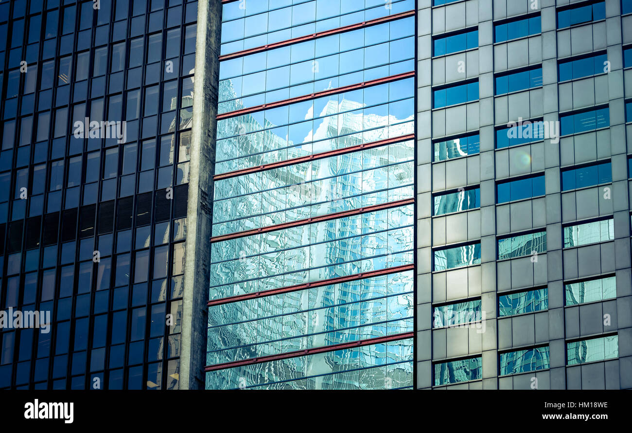 Windows of commercial building in Hong Kong Stock Photo - Alamy