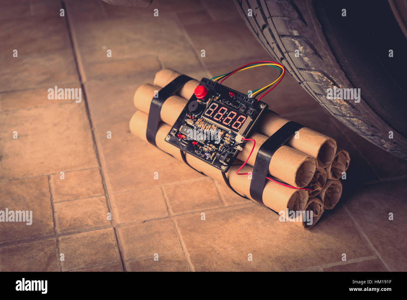 TNT time bomb near wheel of car ( Filtered image processed vintage ...