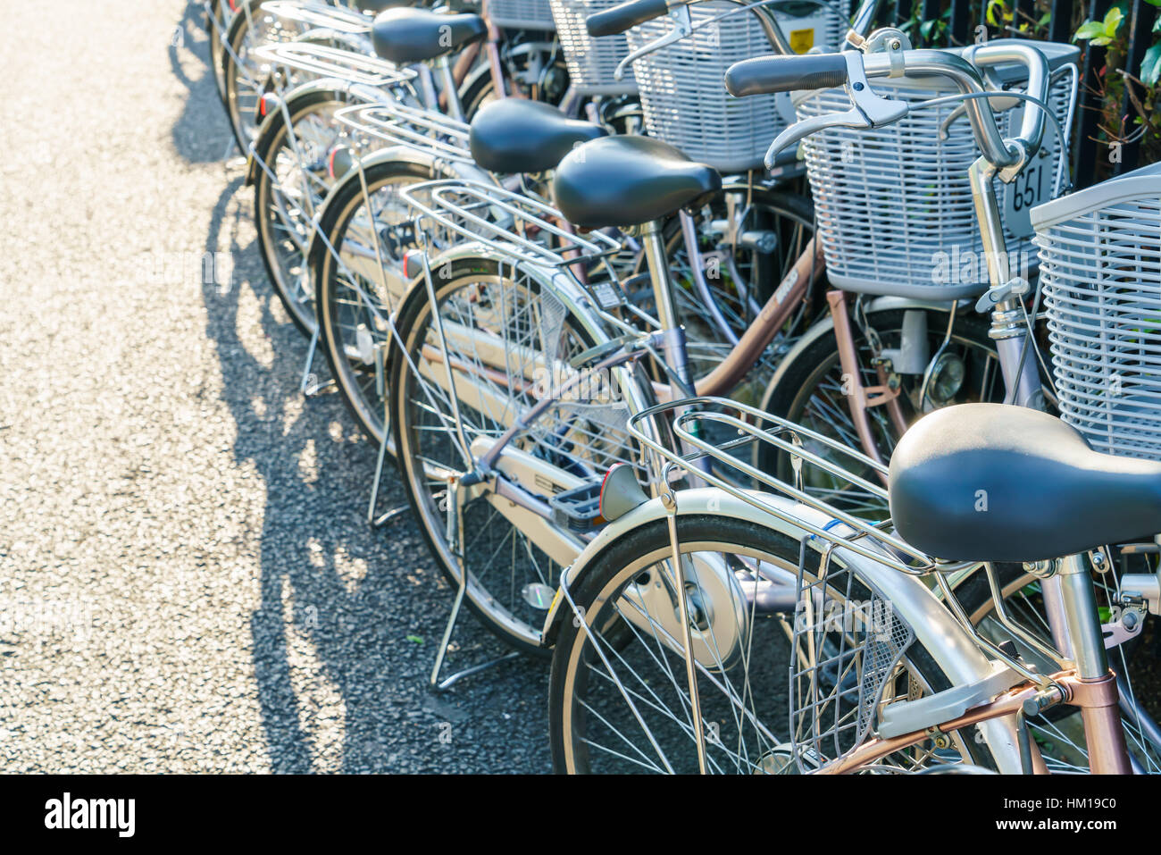 Row of bikes parking Stock Photo - Alamy