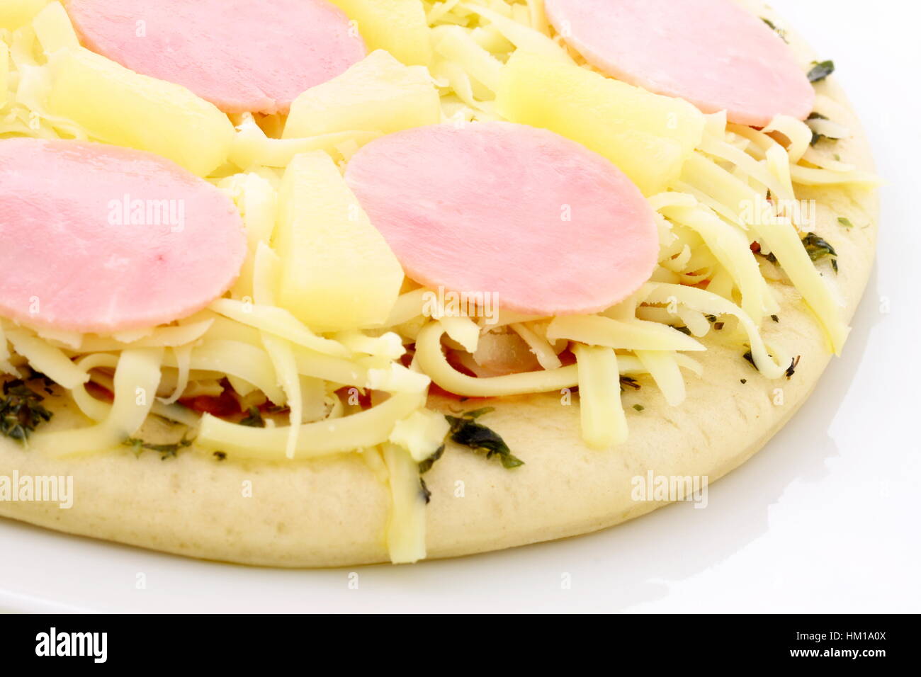delicious hawaiian rustic style pizza made with fresh pineapples,ham ...