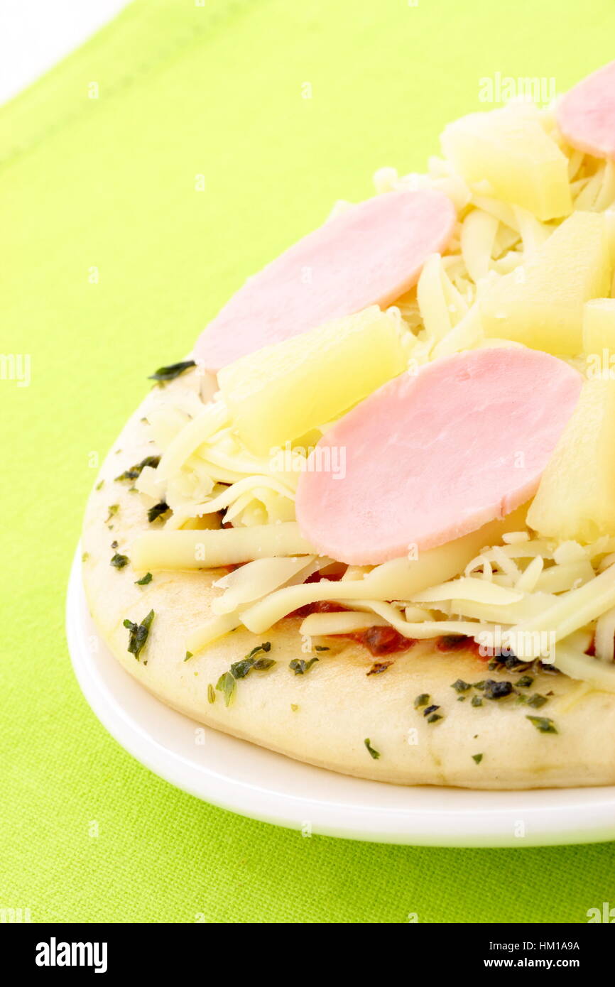 delicious hawaiian rustic style pizza made with fresh pineapples,ham ...