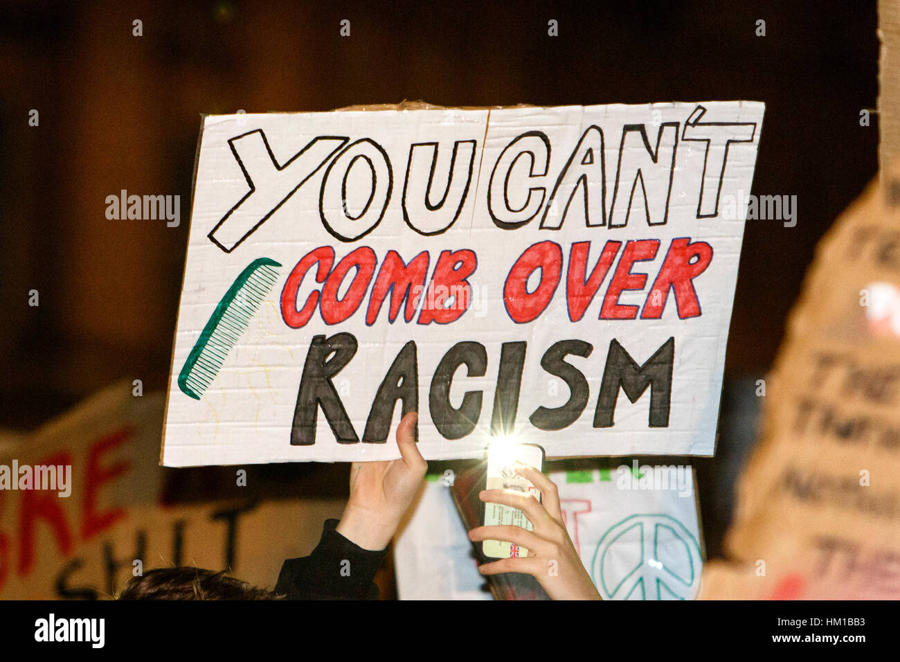 Bristol, UK. 30th January, 2017. Protesters carrying Anti Trump ...