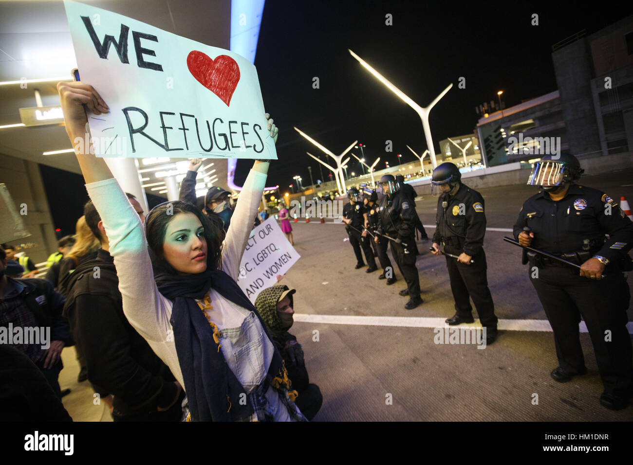 Refugees sign hi-res stock photography and images - Alamy