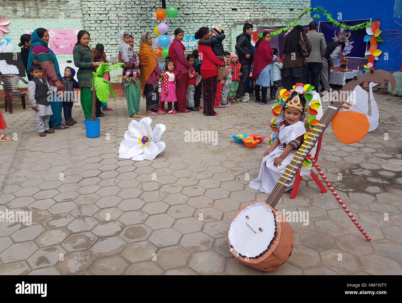 Kathmandu, Nepal. 1st Feb, 2017. A Nepalese girl dressed up as Goddess Saraswati smiles during ...