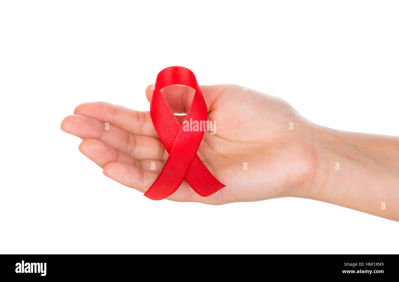 AIDS ribbon in hand isolated on white background Stock Photo - Alamy