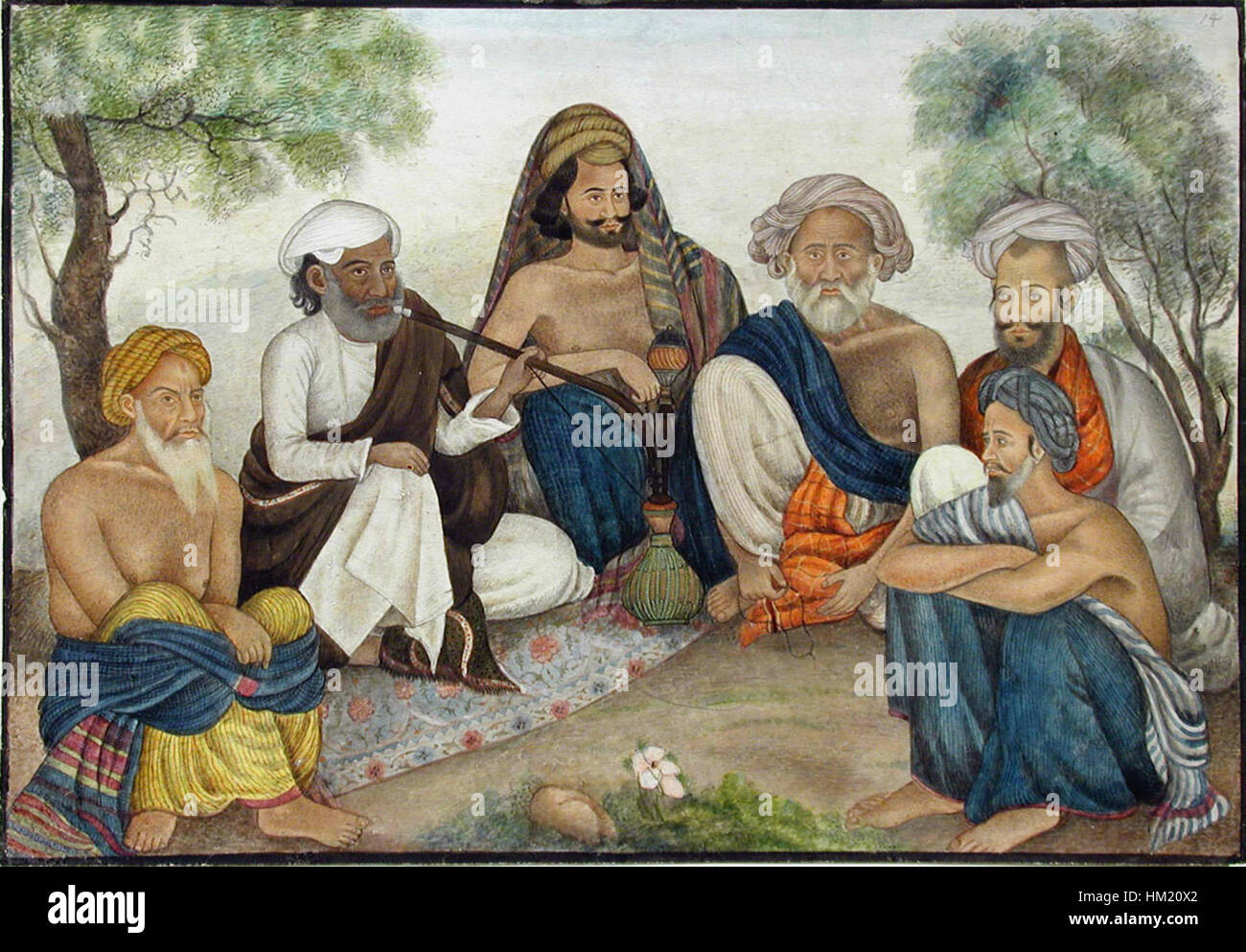 This image shows Khan Bahadur Khan alongside members of his clan, a ...