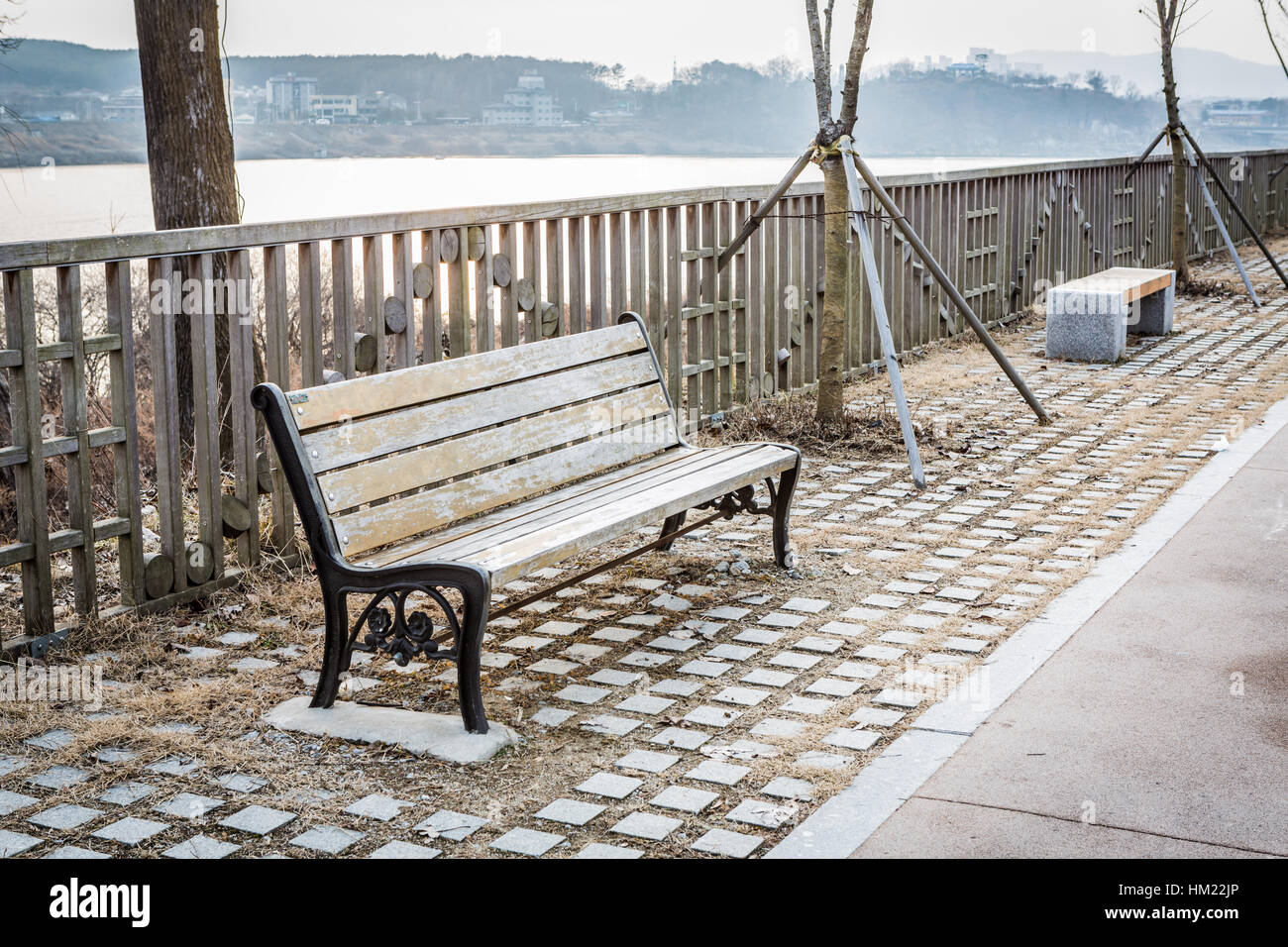 Vintage bench at the river Stock Photo - Alamy