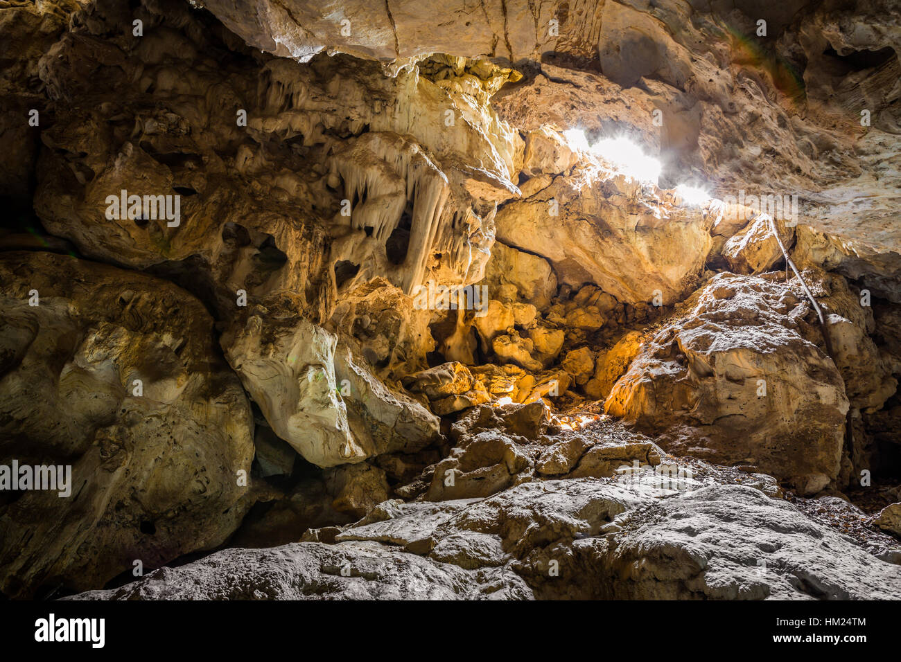 Sun light in cave Stock Photo - Alamy