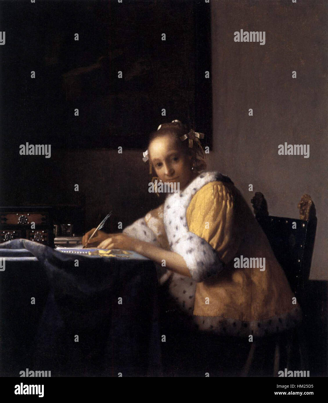 Johannes Vermeer's 'A Lady Writing a Letter' captures a serene moment ...