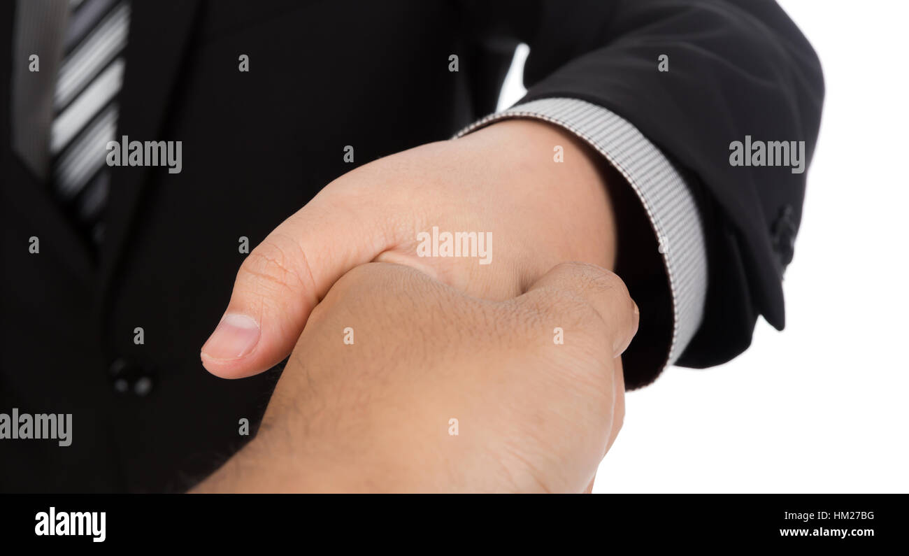 Businessman offering for handshake Stock Photo - Alamy