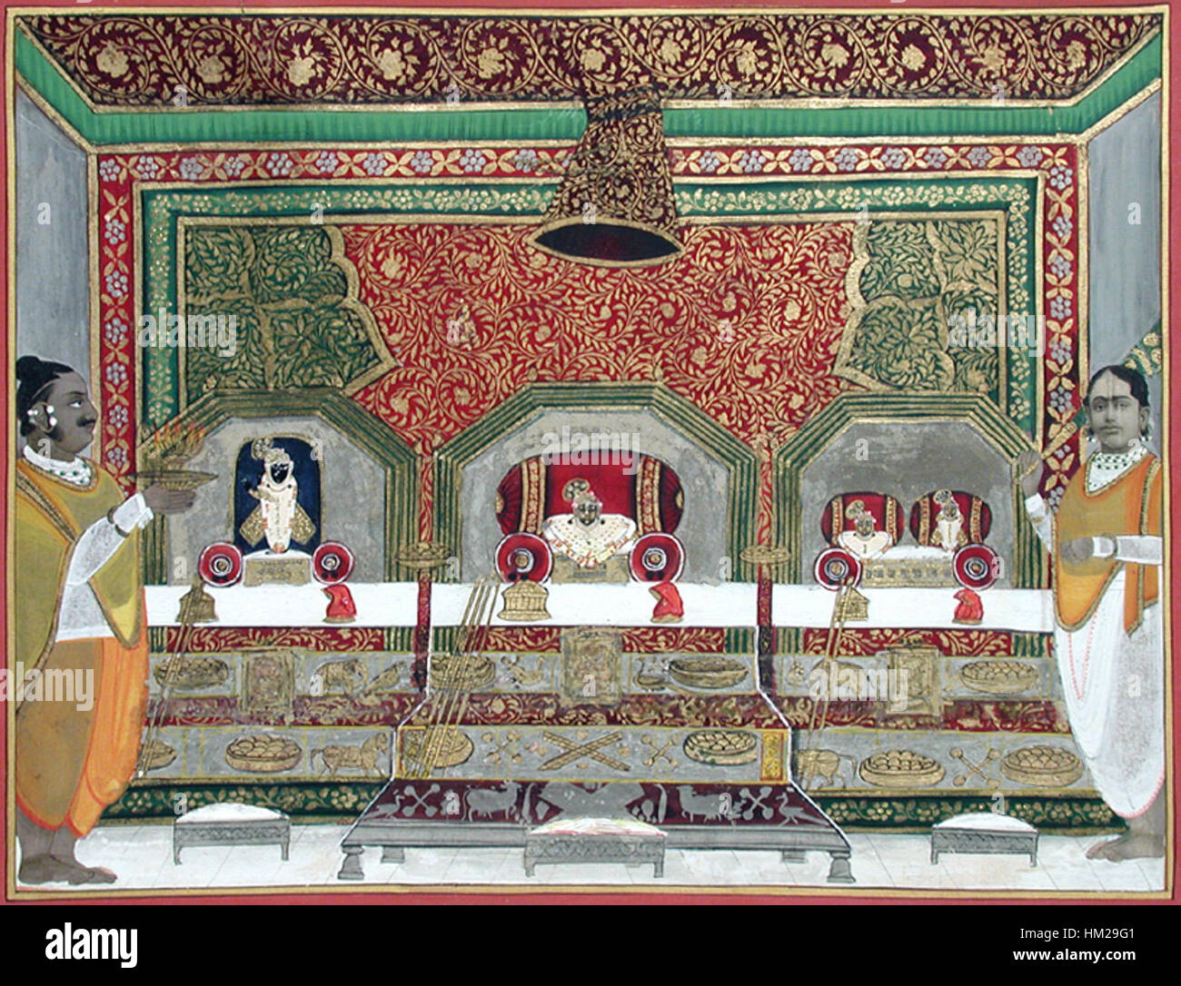 In the service of the Lord- priests performing worship in a Vallabha ...