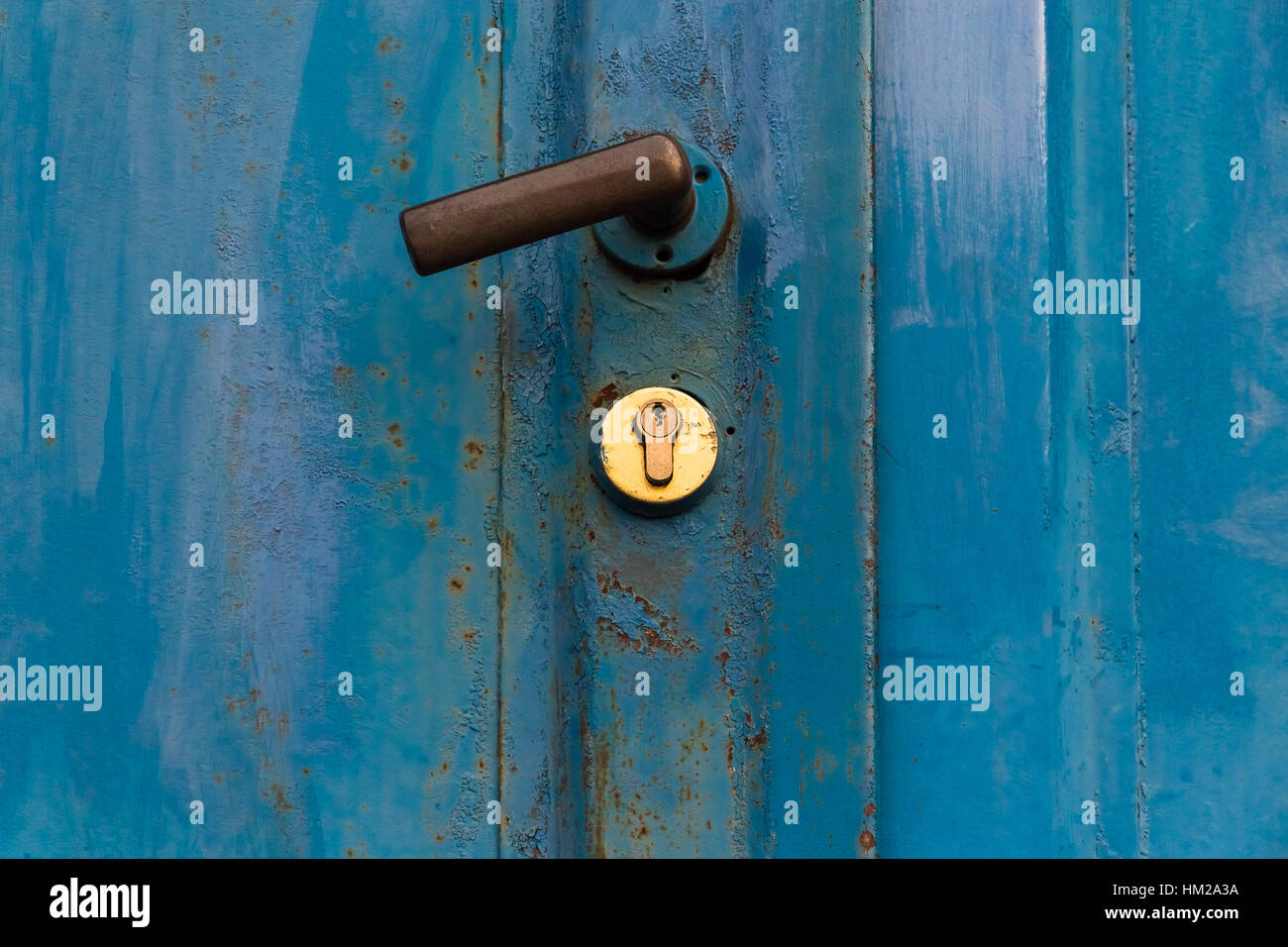 Steel door blue lock hi-res stock photography and images - Alamy